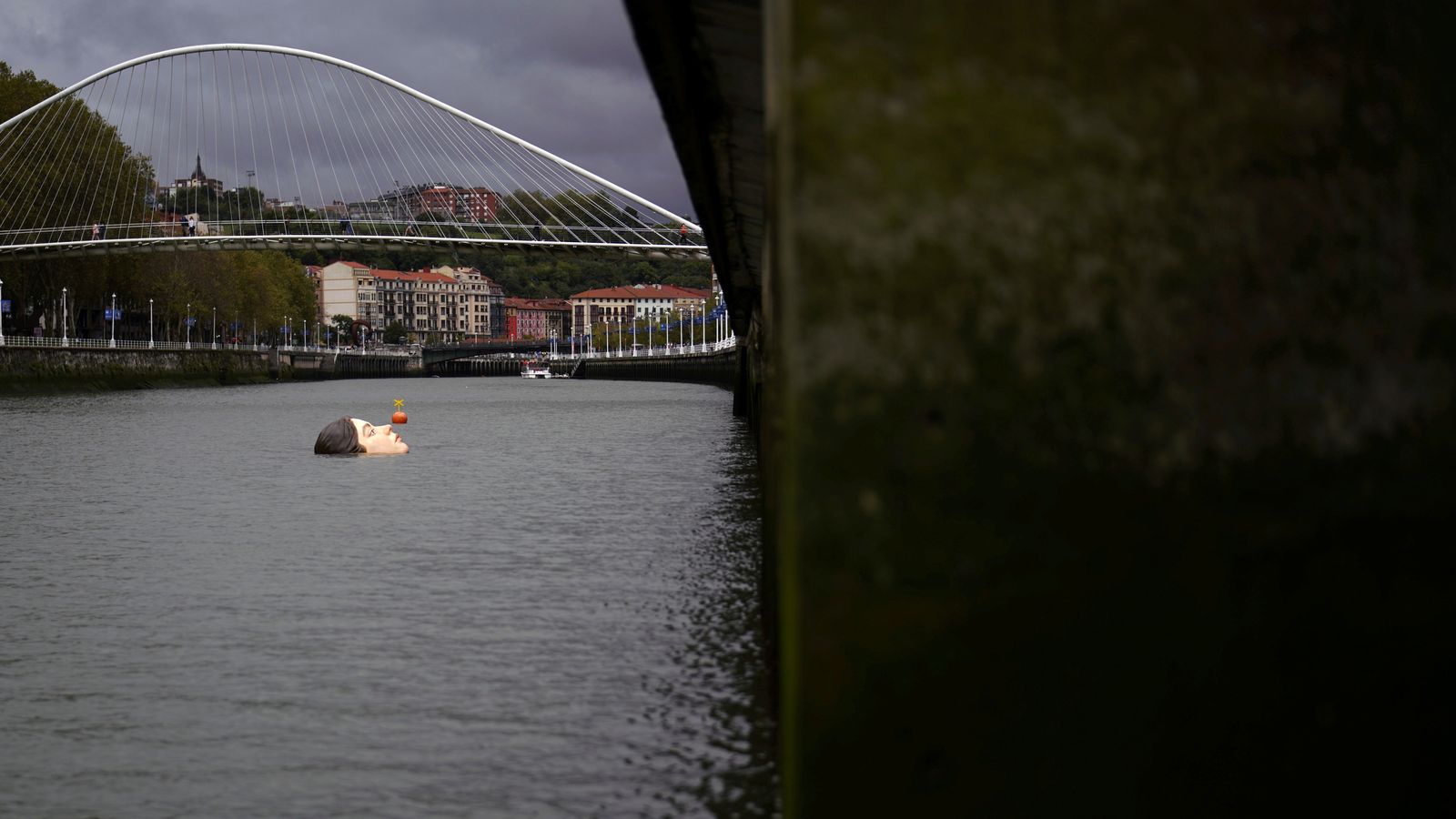 Eerie drowning girl statue in Bilbao river aims to encourage debate ...