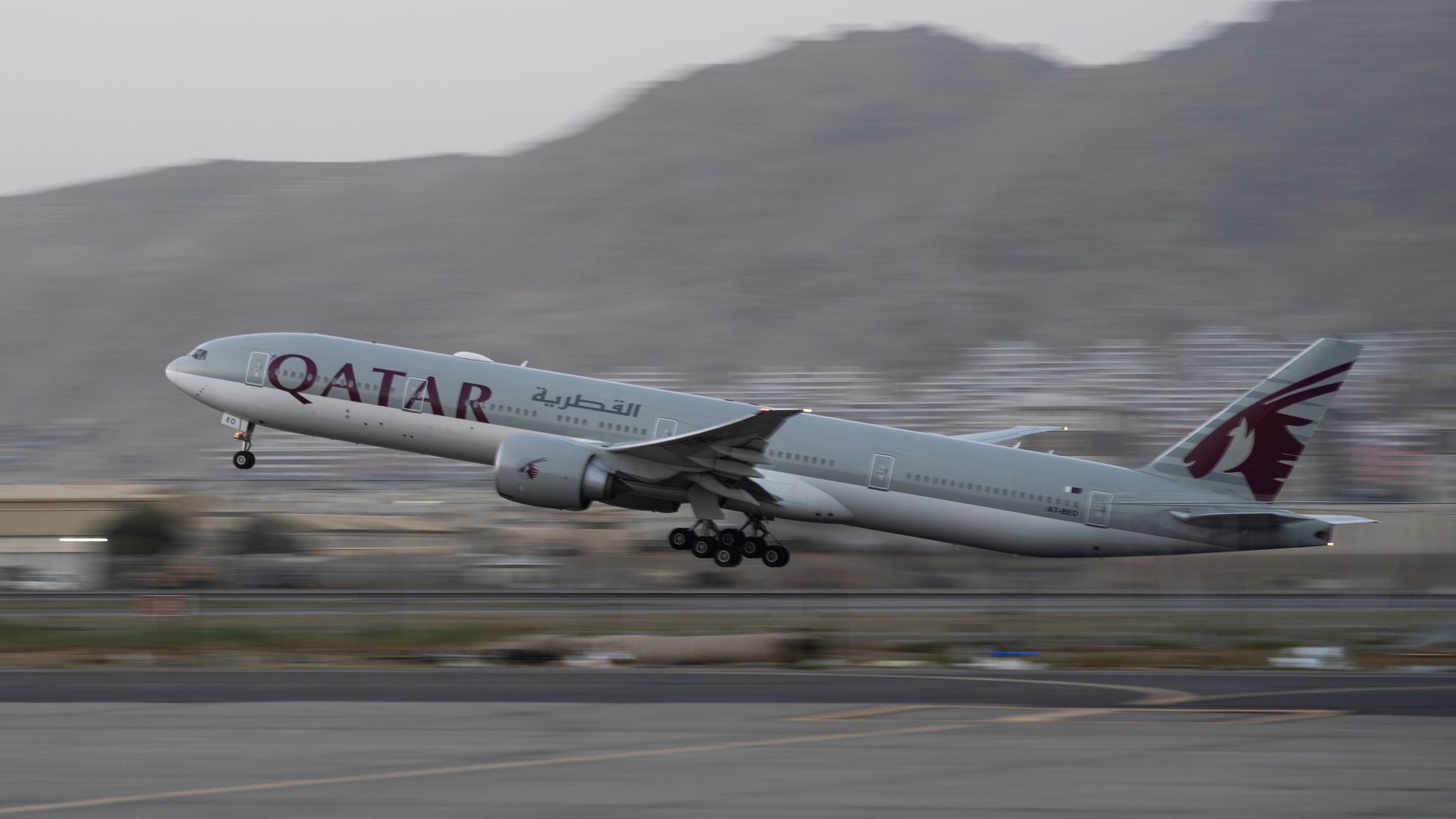 Chartered flight carrying westerners lands in Doha after leaving Kabul ...