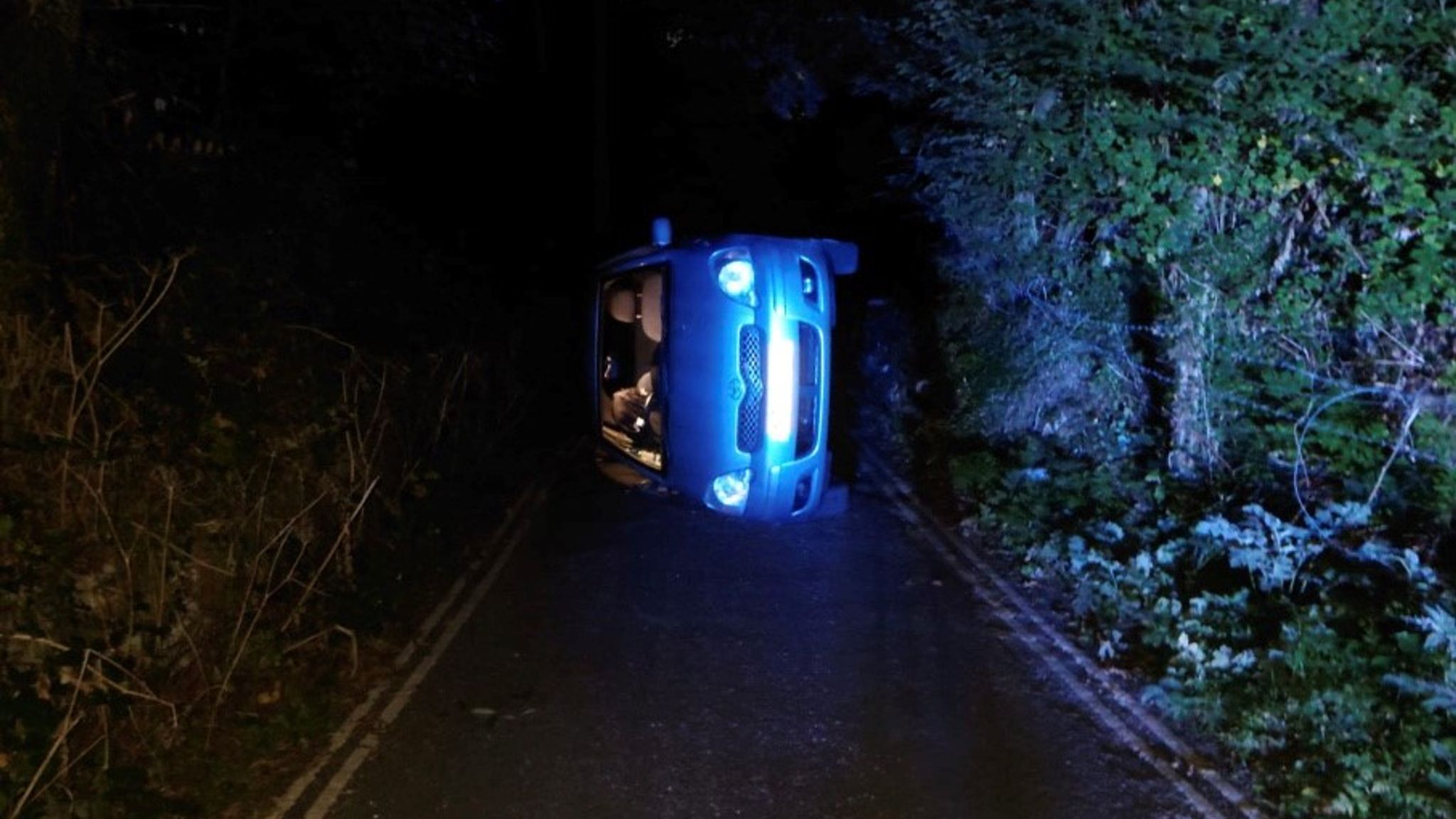 Derbyshire police rescue couple trapped in overturned car after ...