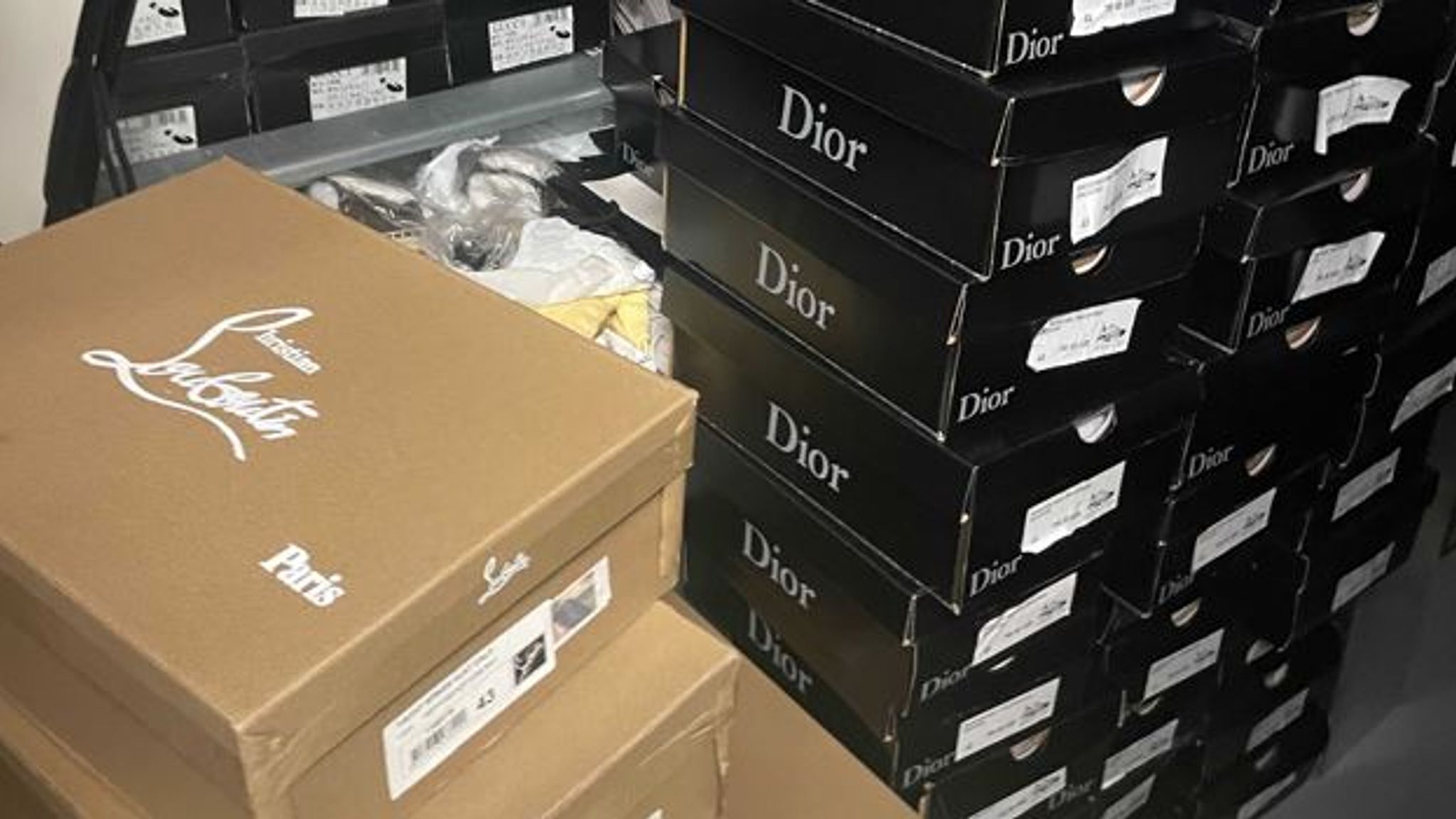 Fake shoes, bags and perfume among huge £500m haul of counterfeit items ...