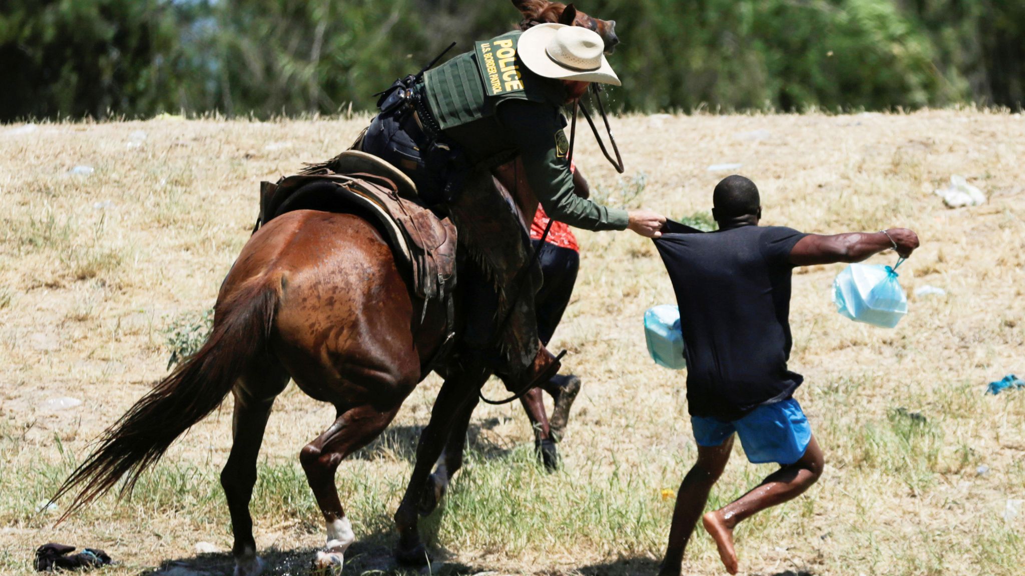 White House responds to 'horrific' photos of Texas border agent on ...
