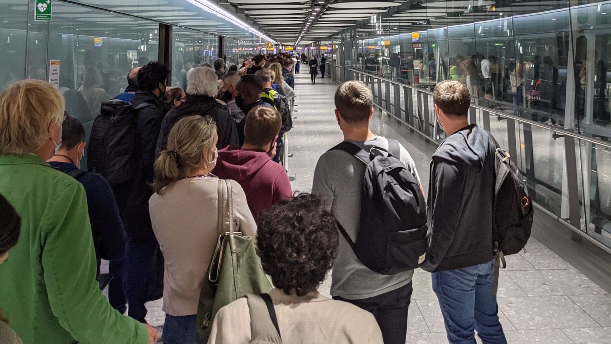 Covid-19: Queues at Heathrow so long pregnant woman fainted are ...