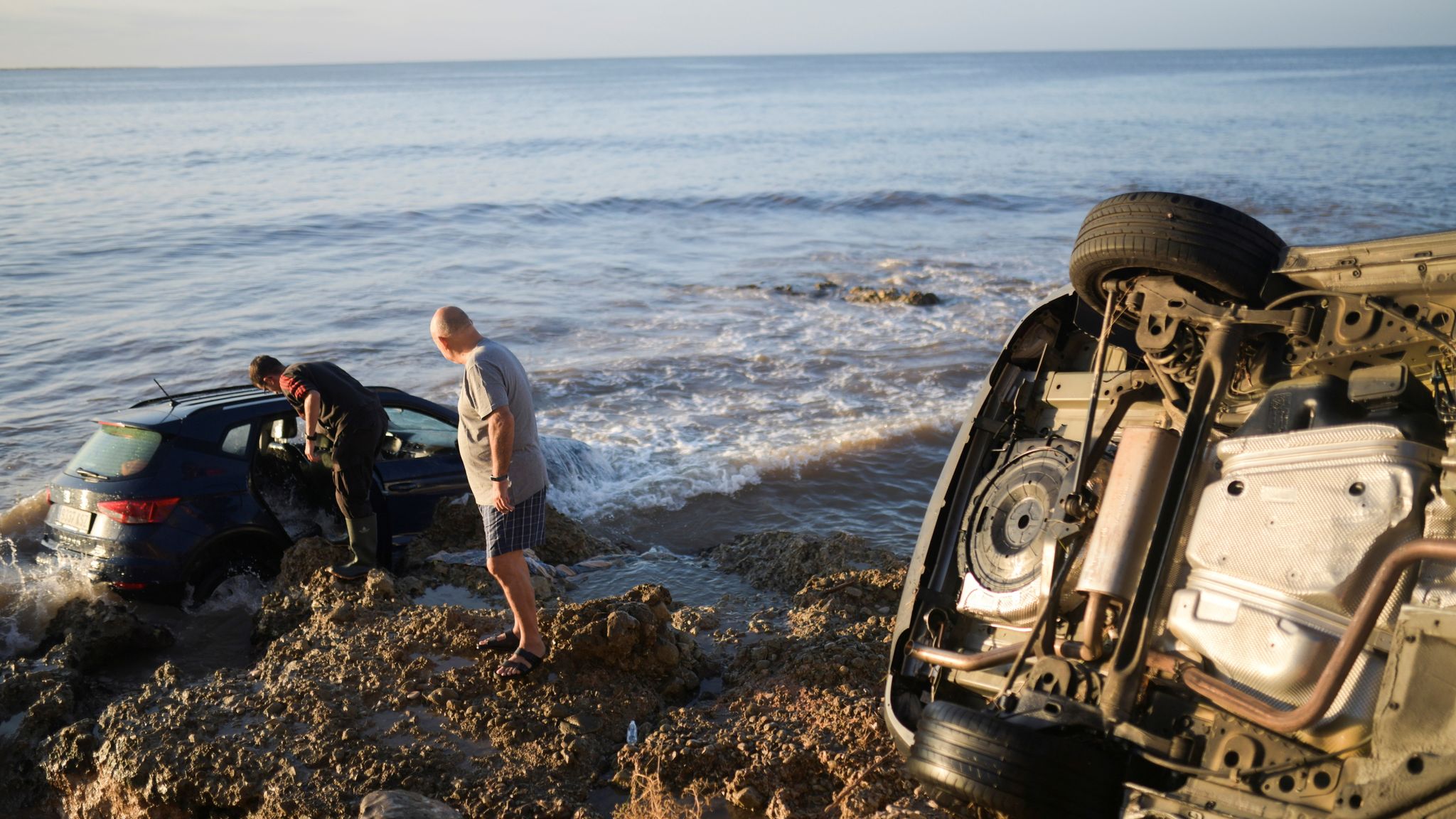 Spain: Intense flooding sees cars swept into Mediterranean Sea and ...