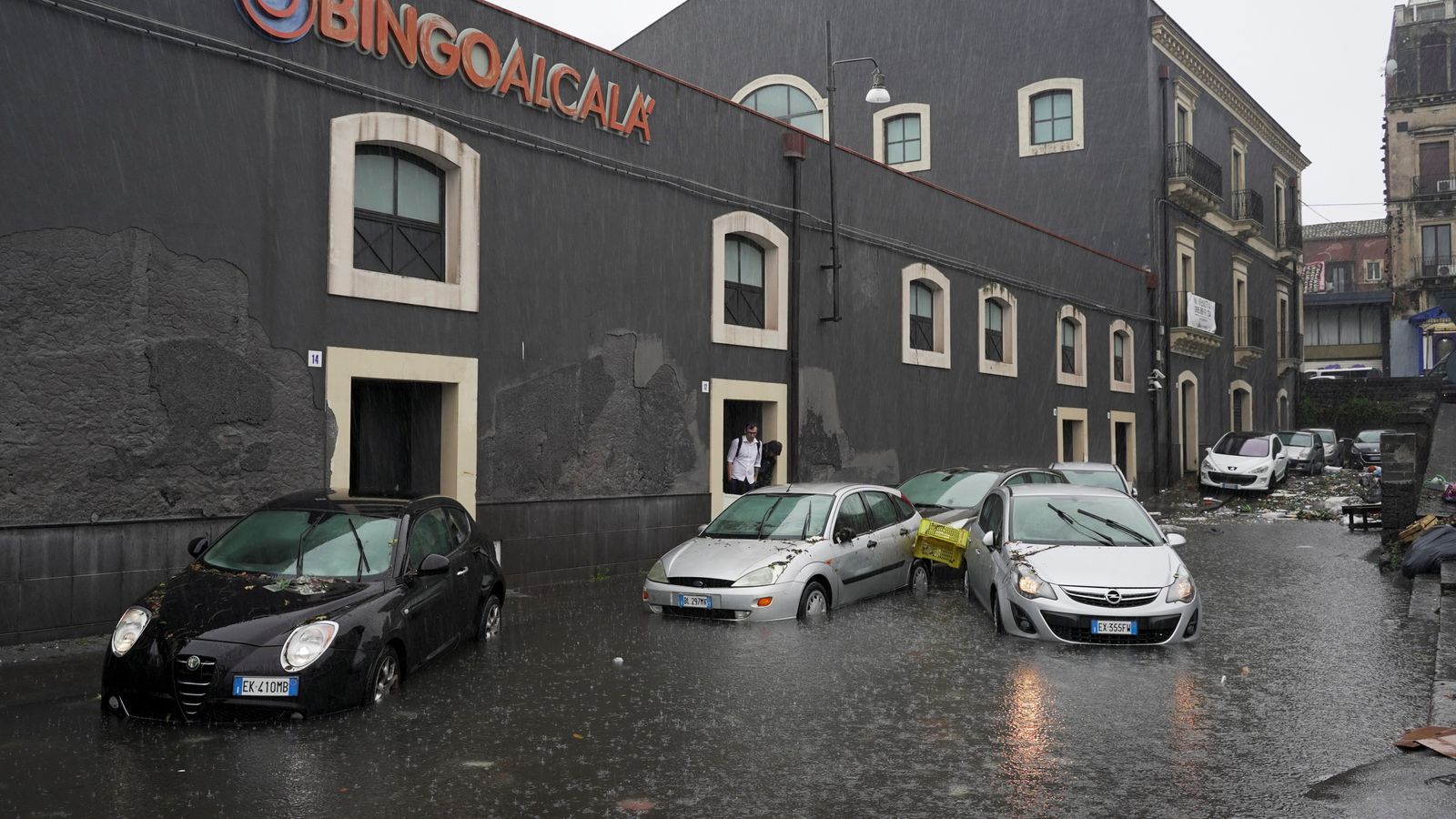 Sicily flooding: Two die after fierce storm batters Italian island as ...
