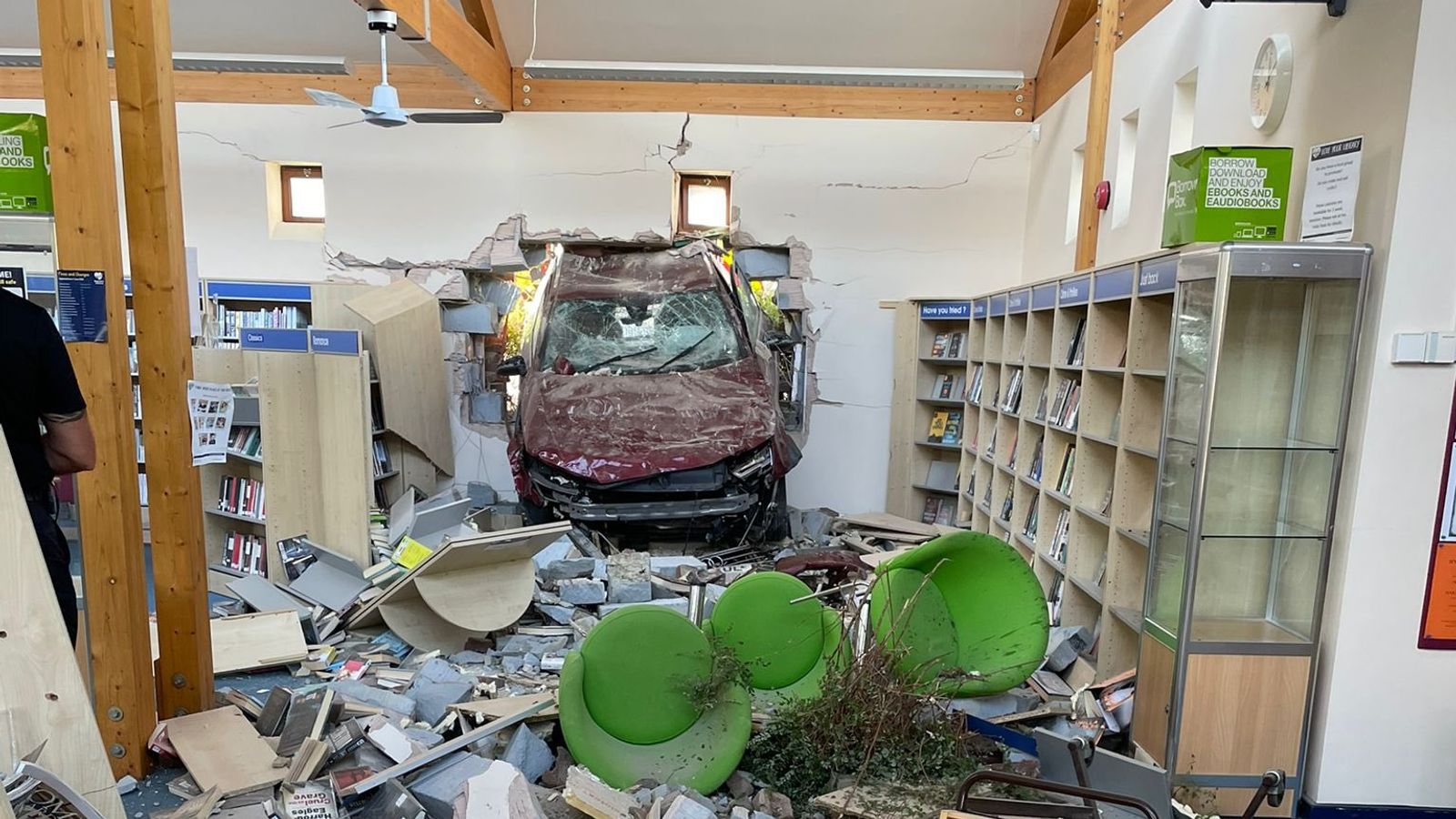 Couple left trapped inside Hampshire library after car smashes through ...