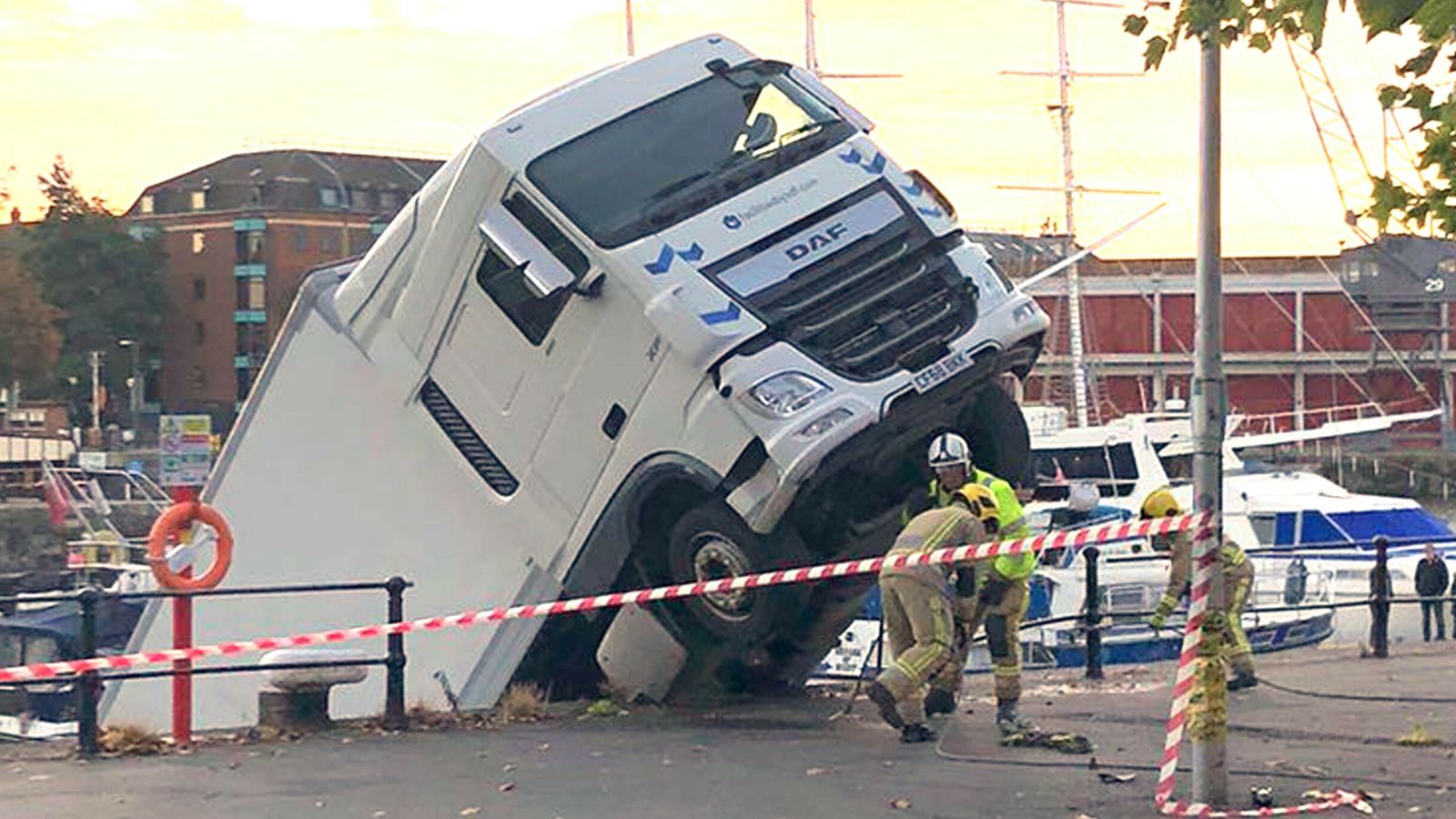 Lorry left dangling on dock edge after plunging into Bristol harbour ...
