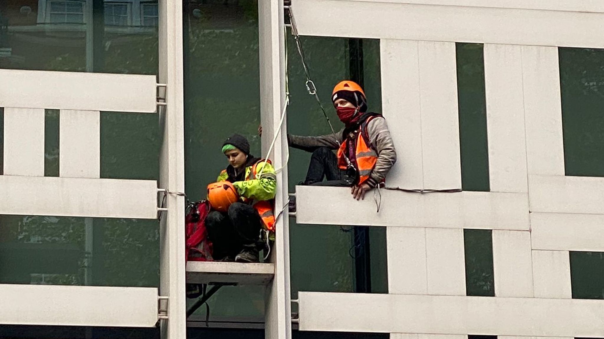 COP26: Animal Rebellion protesters climb Defra and Home Office building ...