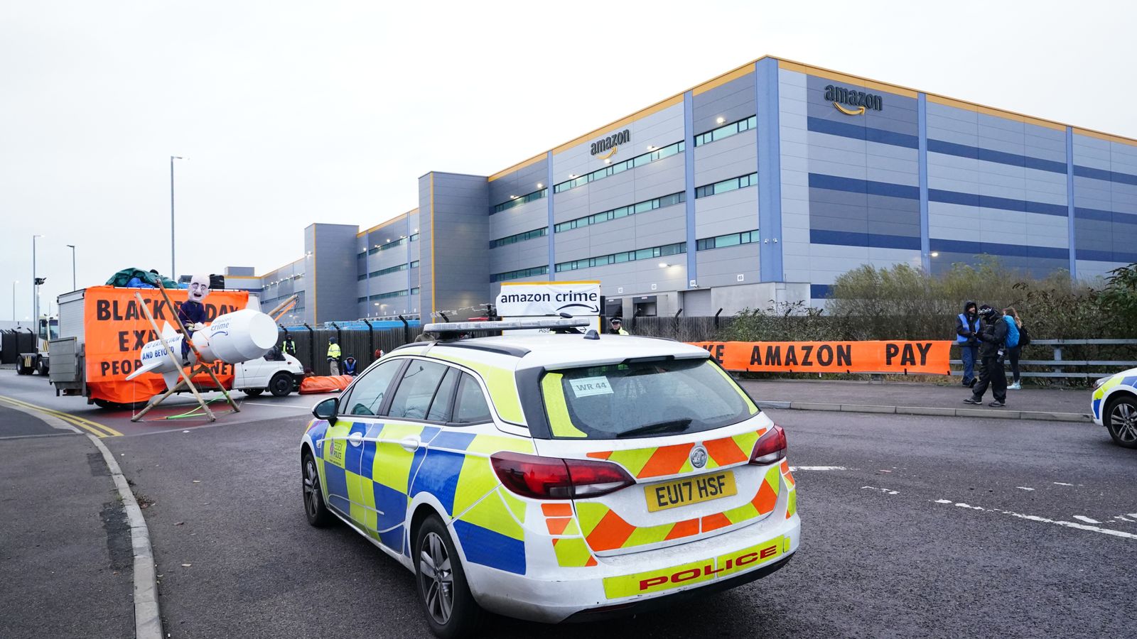 Amazon warehouses targeted by Extinction Rebellion in Black Friday ...