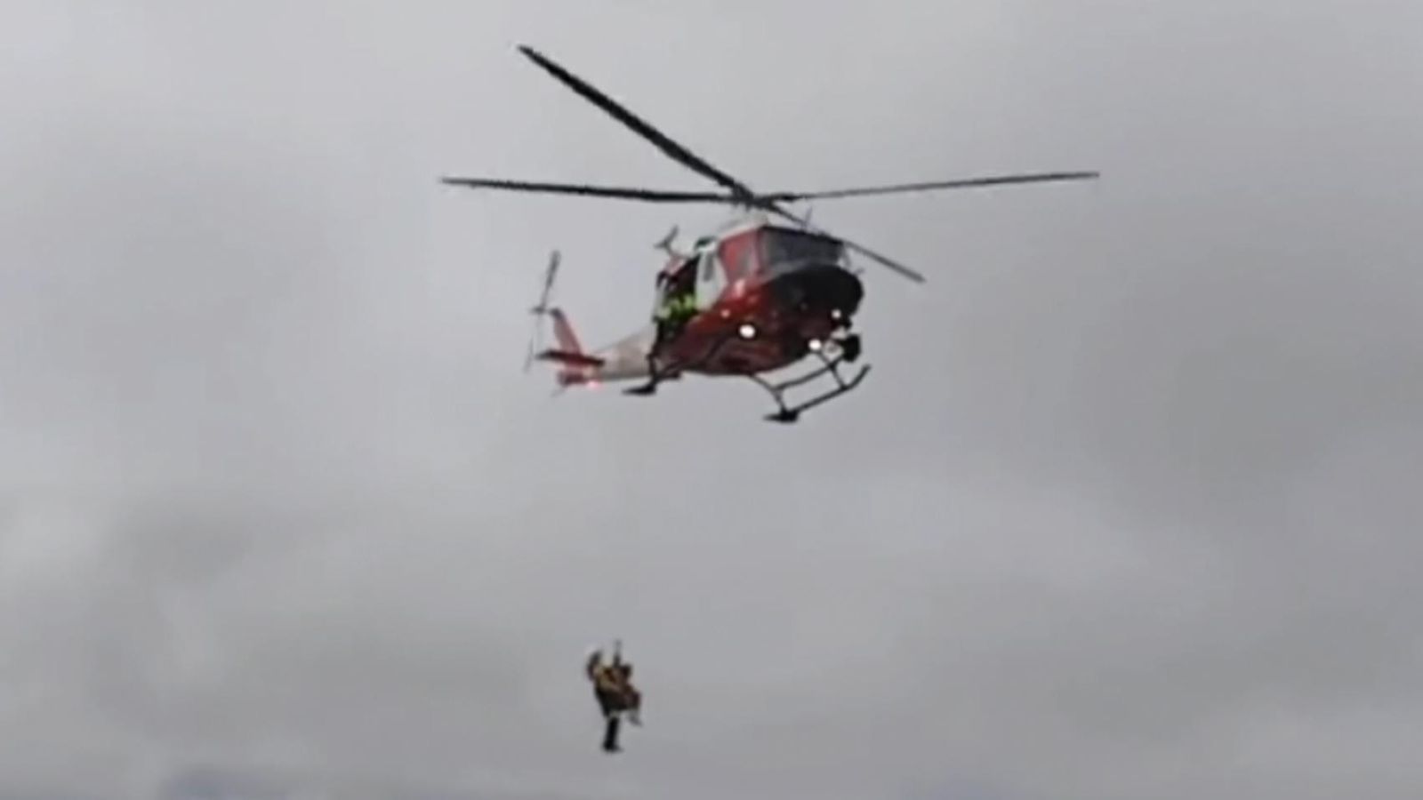 Video: Man rescued from roof of vehicle in Australia | World News | Sky ...