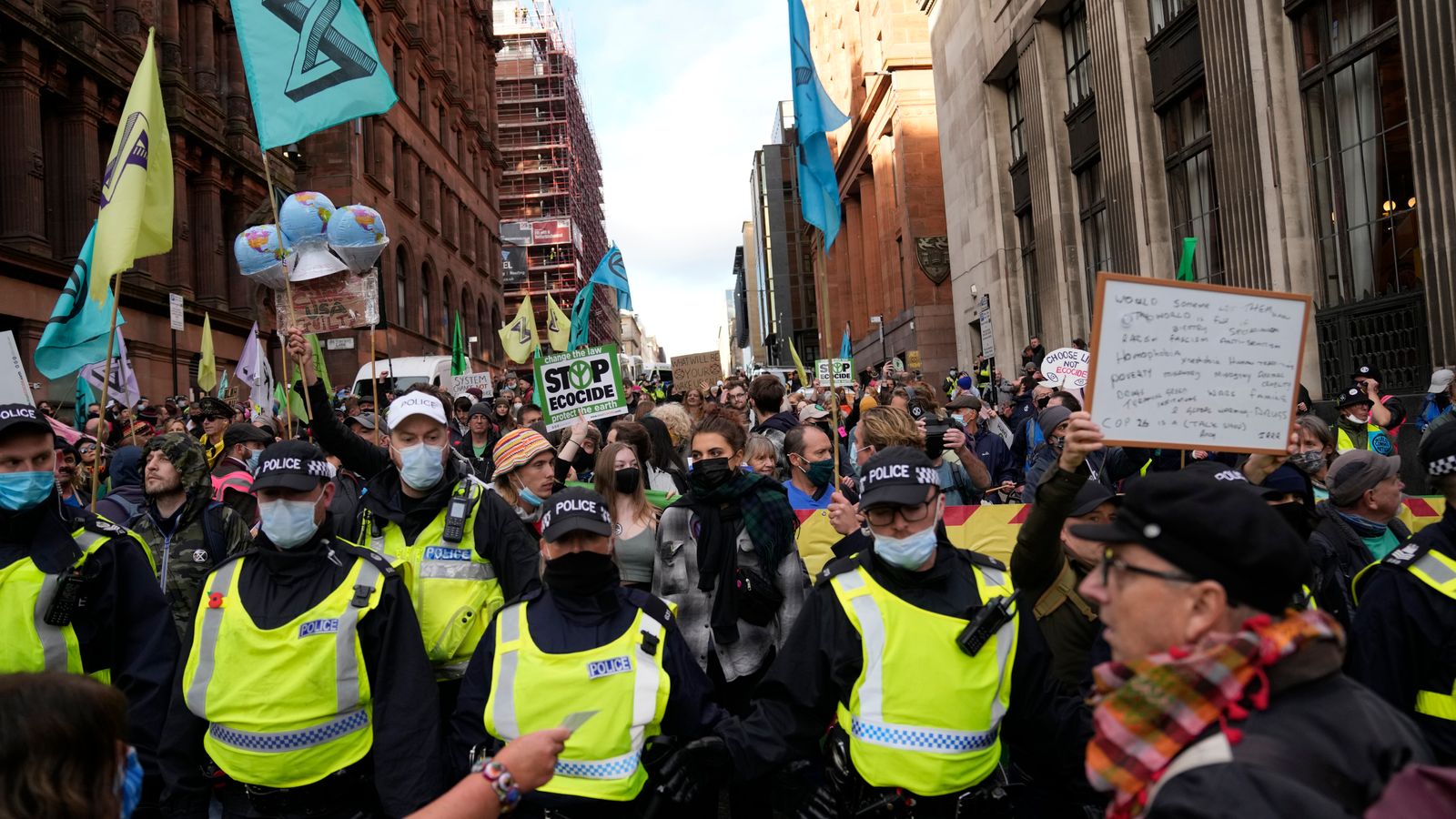 COP26: Police in two-hour stand-off with 'greenwashing' protesters in ...