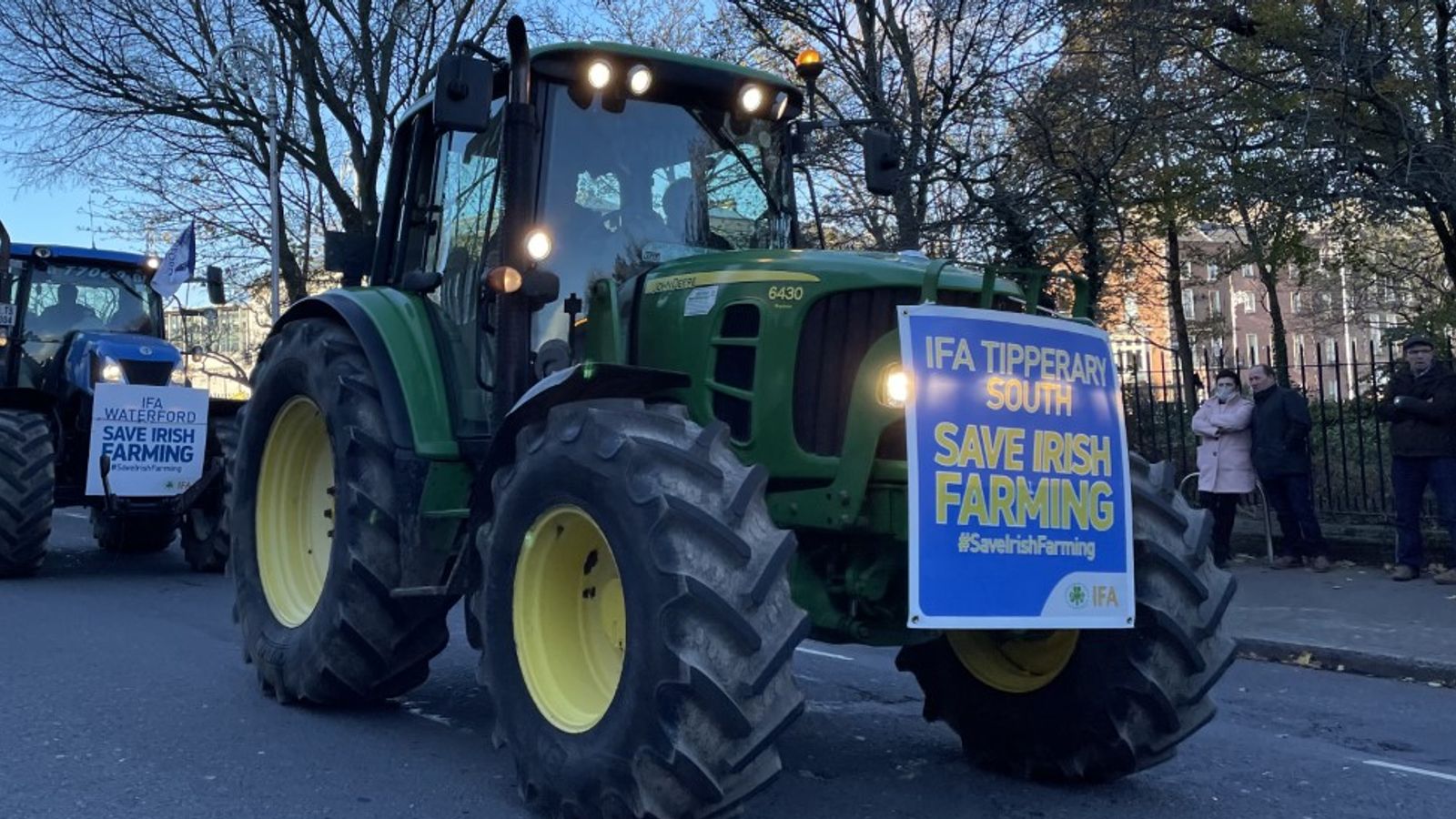 Climate change: Farmers drive tractors through Dublin as they protest ...