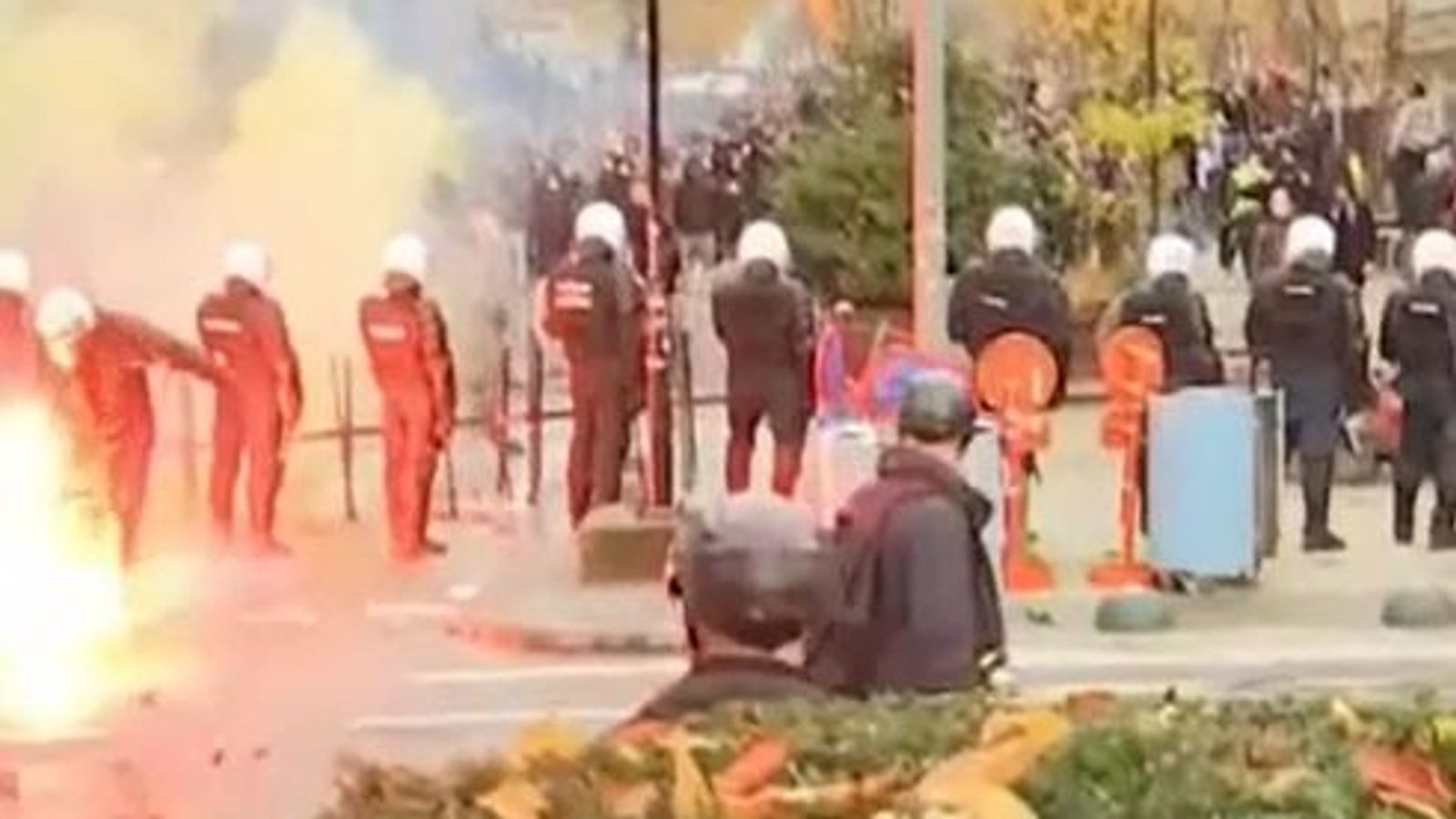 Video: Riot police clash with anti-COVID restriction protesters in ...