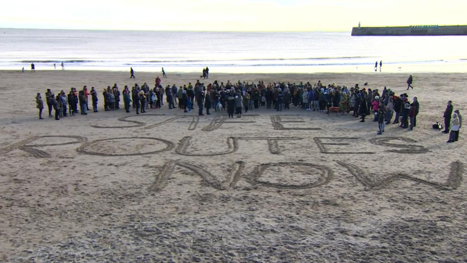 Video: People gather in Folkestone and hold vigil following Channel ...