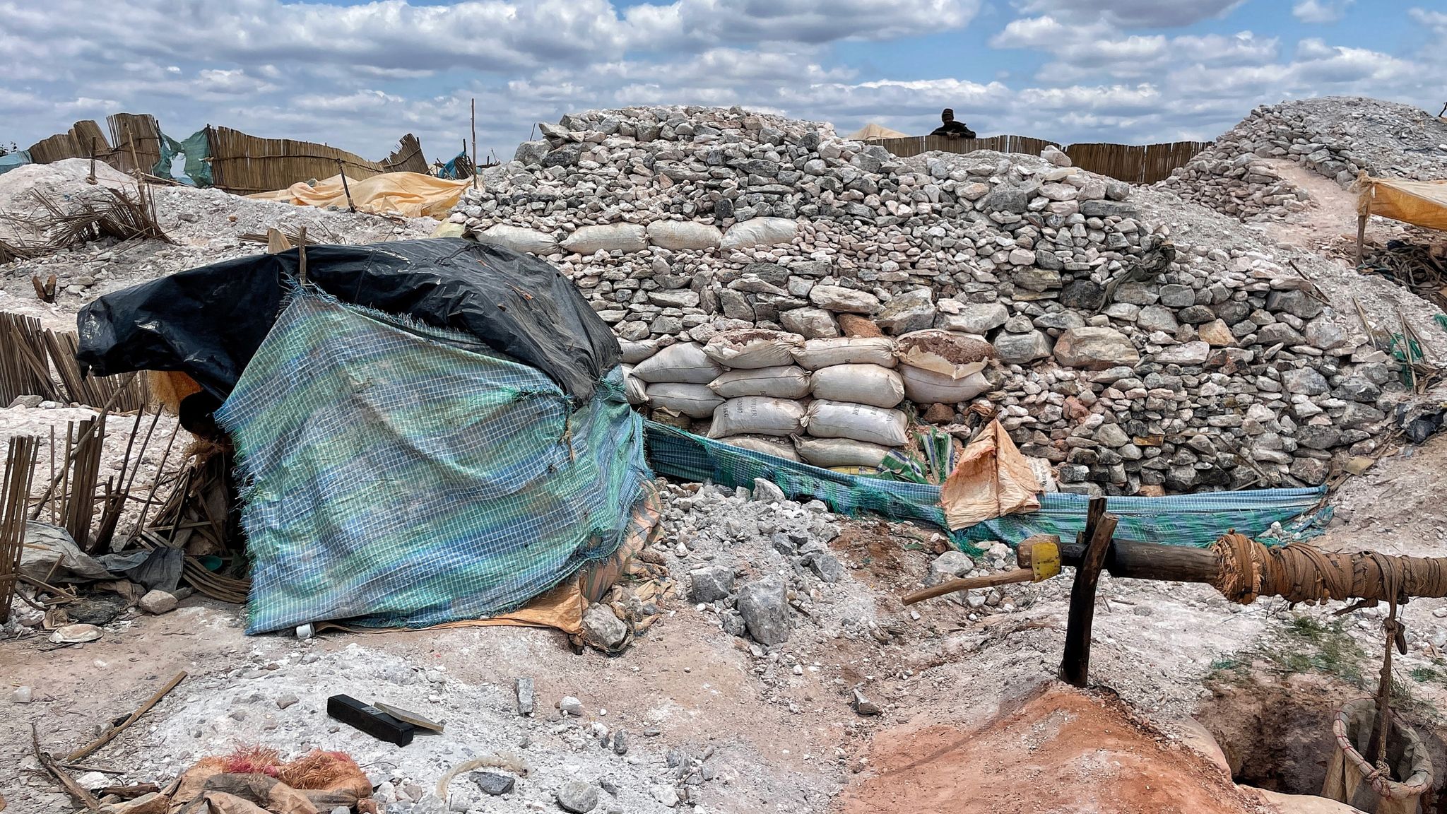 Climate change: In dark, dangerous mines, men risk their lives for ...