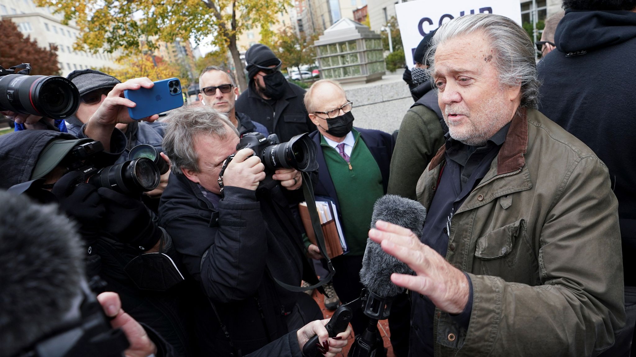 Steve Bannon: Former Trump adviser surrenders to FBI over contempt ...