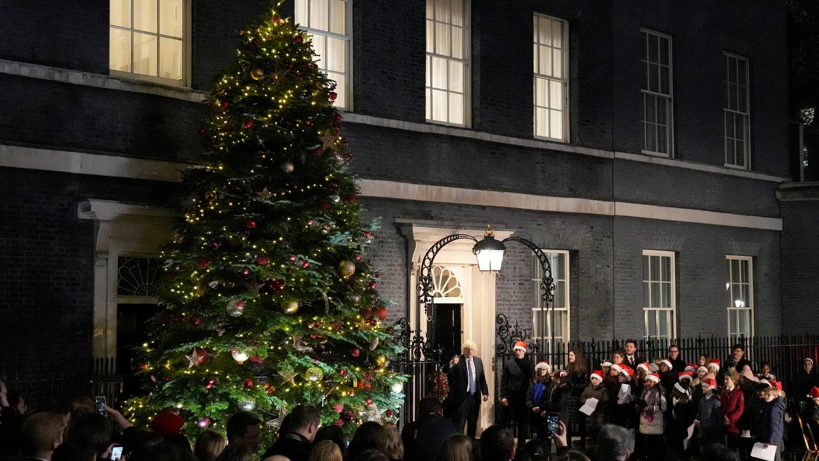 Video: Boris Johnson switches on Christmas tree lights at Downing St ...