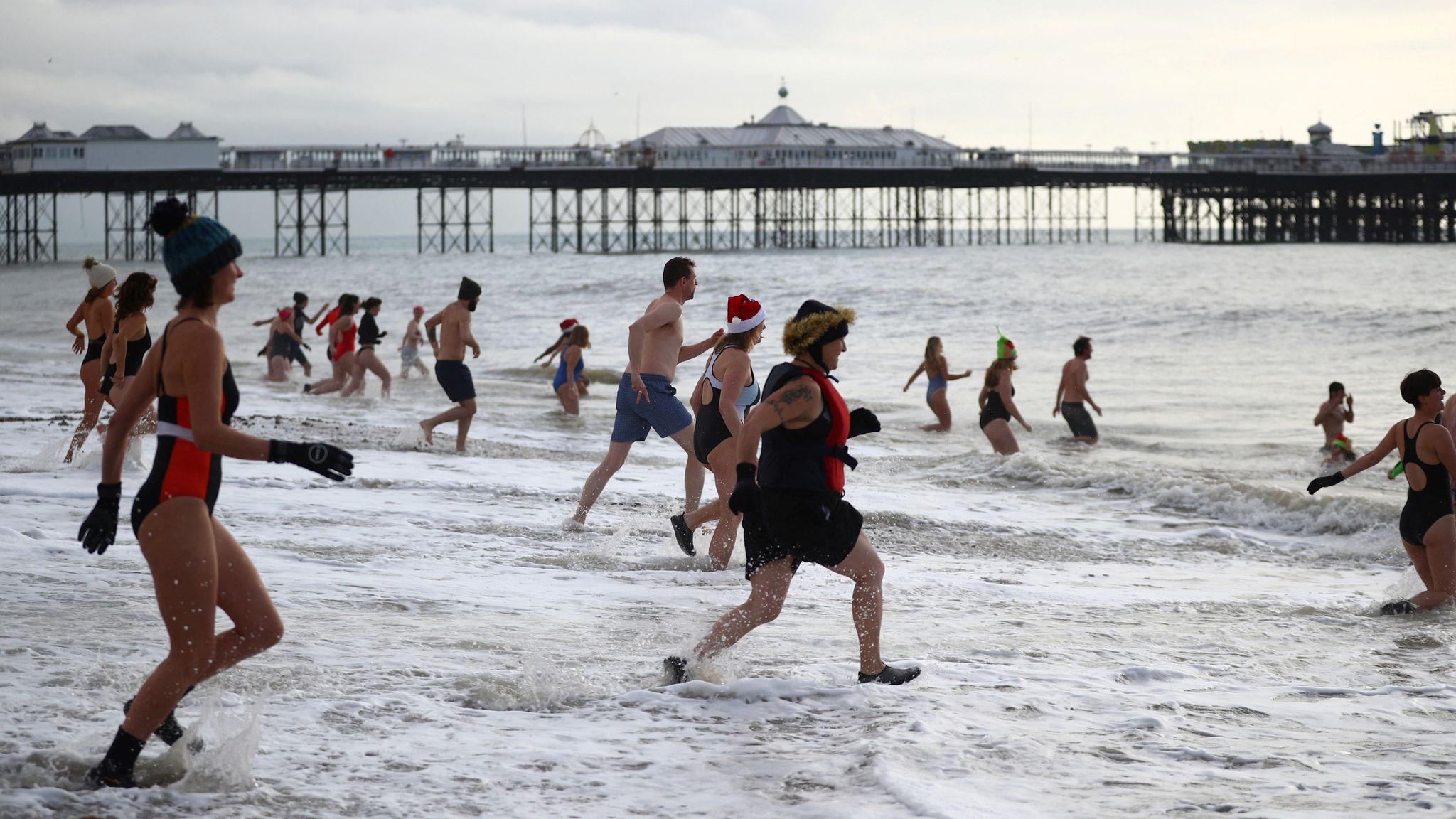 Swimmers take plunge across UK for bracing Christmas morning dip | UK ...