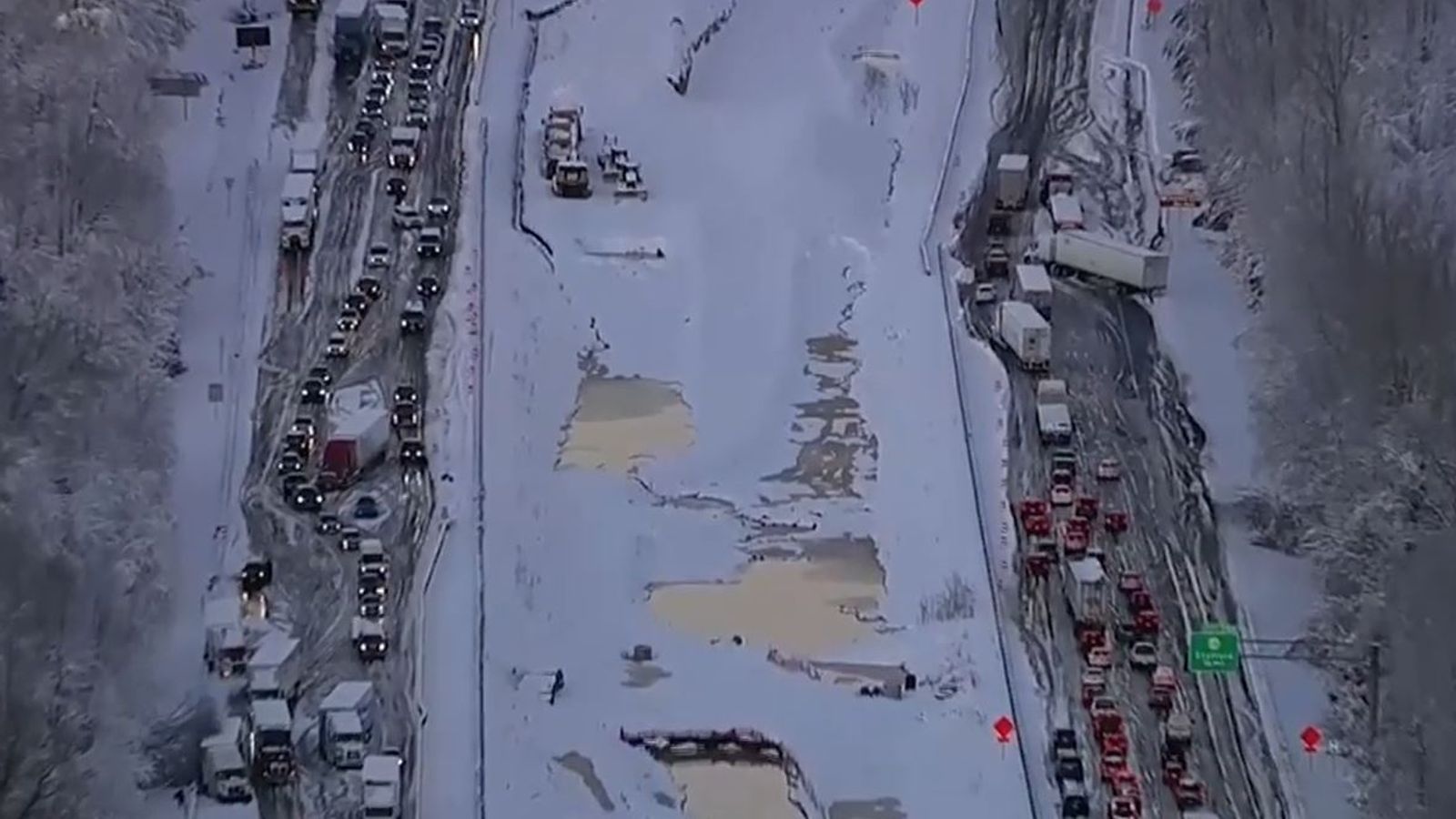 Hundreds of drivers stranded overnight on snow-hit US motorway | US ...