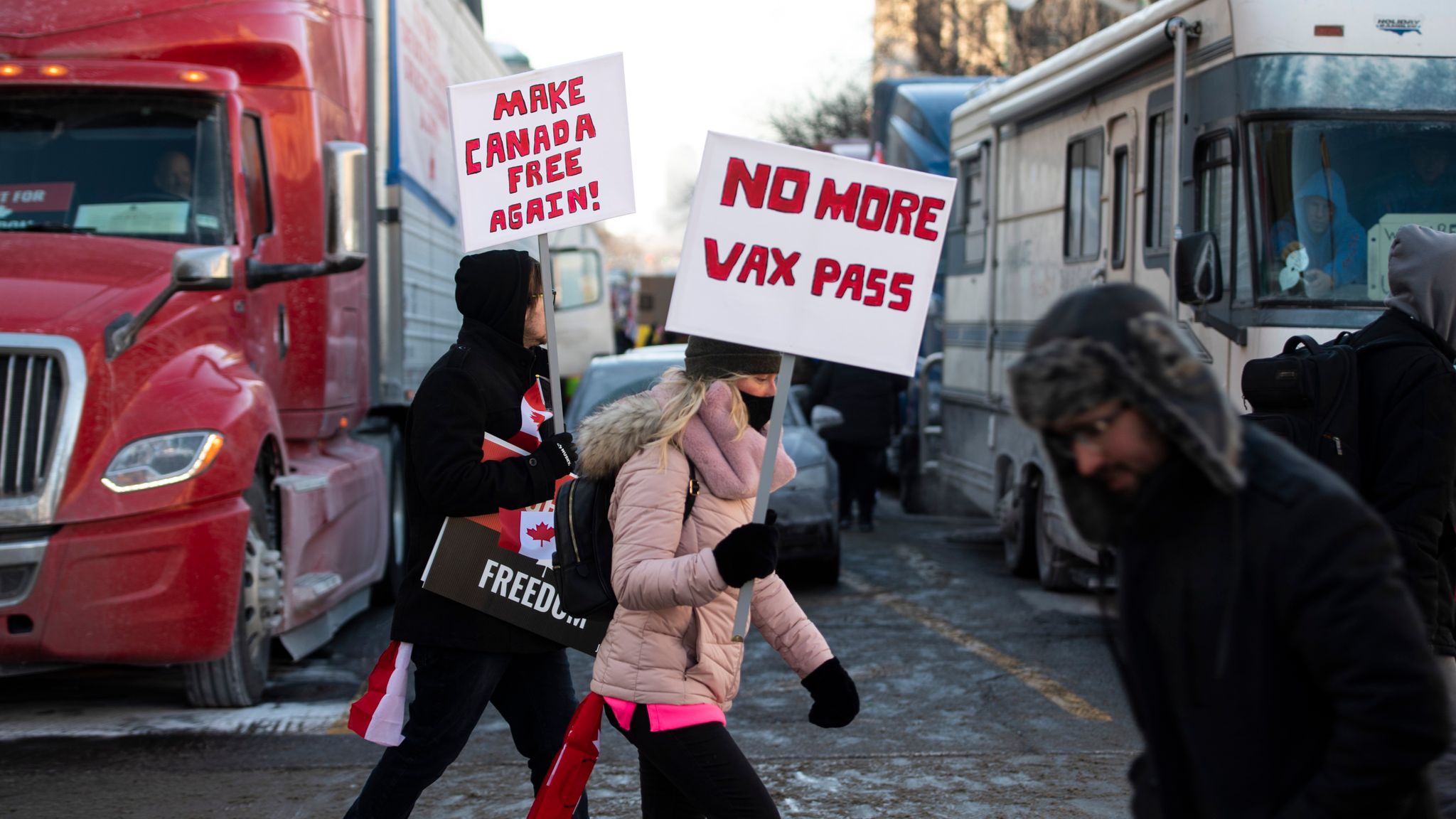 Truckers in Canada protest COVID mandate as some demonstrators dance on ...