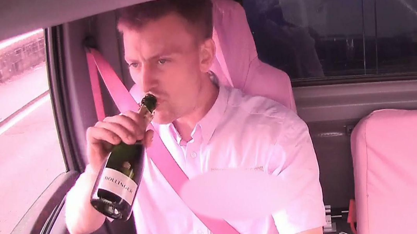 Man jailed after driving work van while swigging champagne and phoning ...