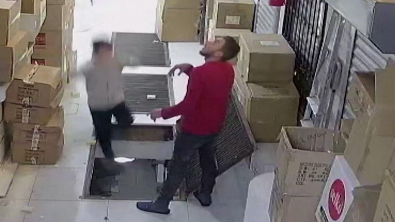 Boy who fell through trapdoor in Istanbul building lands on stack of ...