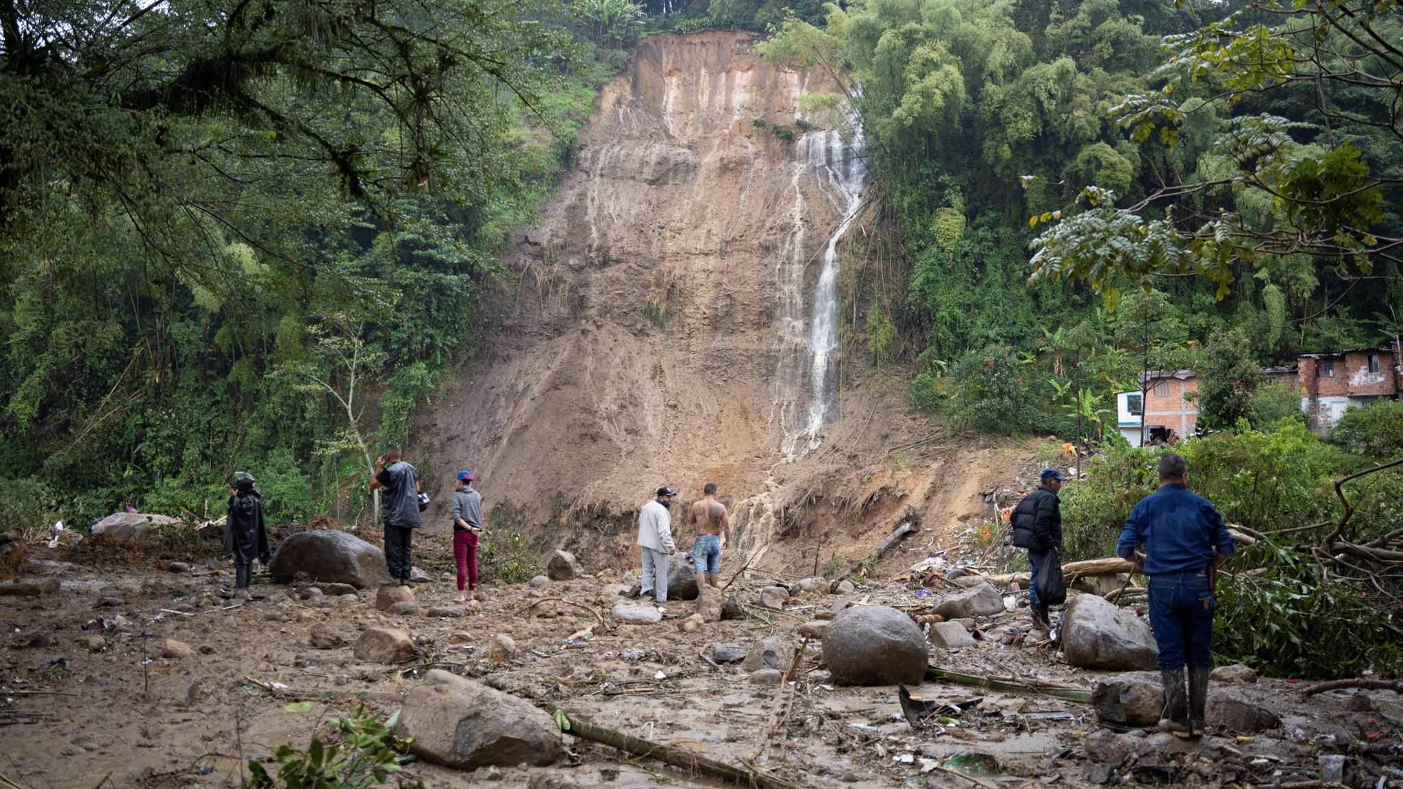 At least 14 killed as mudslide brought on by heavy rain hits Colombian ...