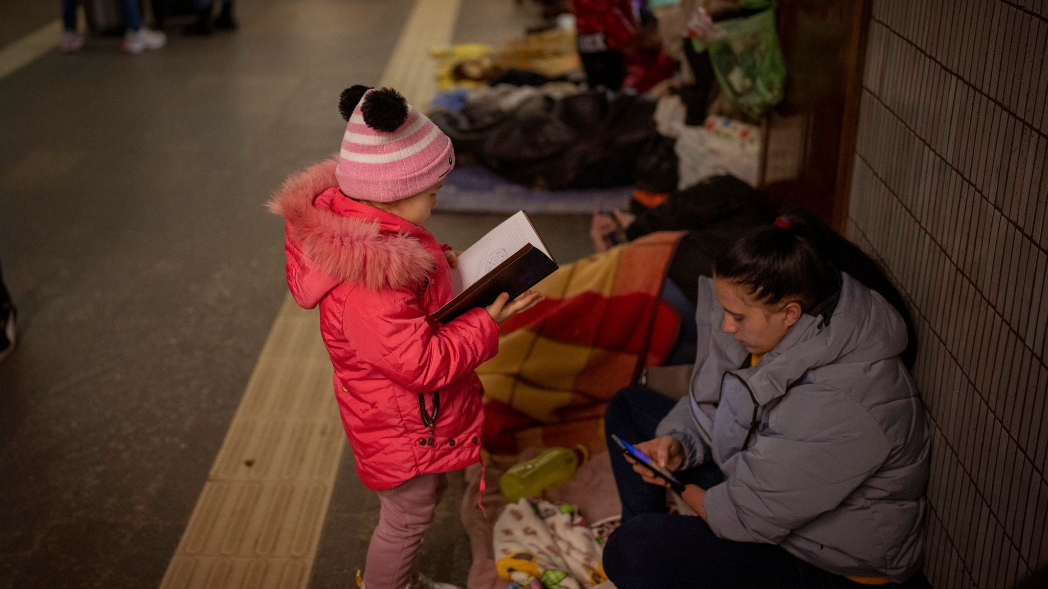 Ukraine invasion: Life underground as people take refuge in basements ...