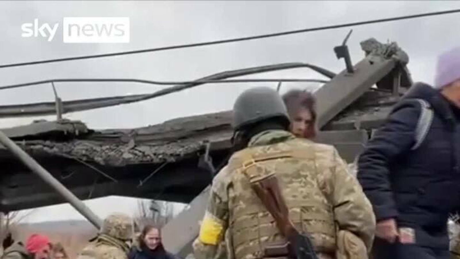 Ukraine: Civilians guided over destroyed bridge outside Kyiv | World ...