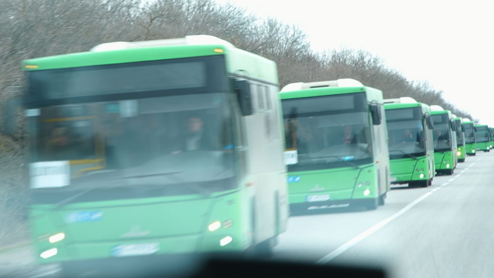 Ukraine war: Buses hurtle along Mykolaiv's deserted streets on the only ...