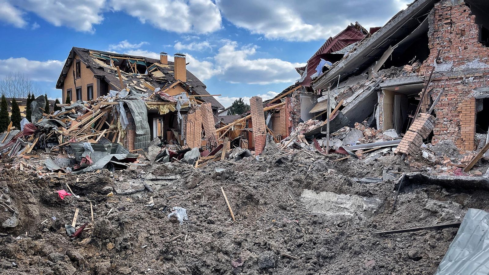 Ukraine war: Picking through the wreckage from Russian bombs outside ...