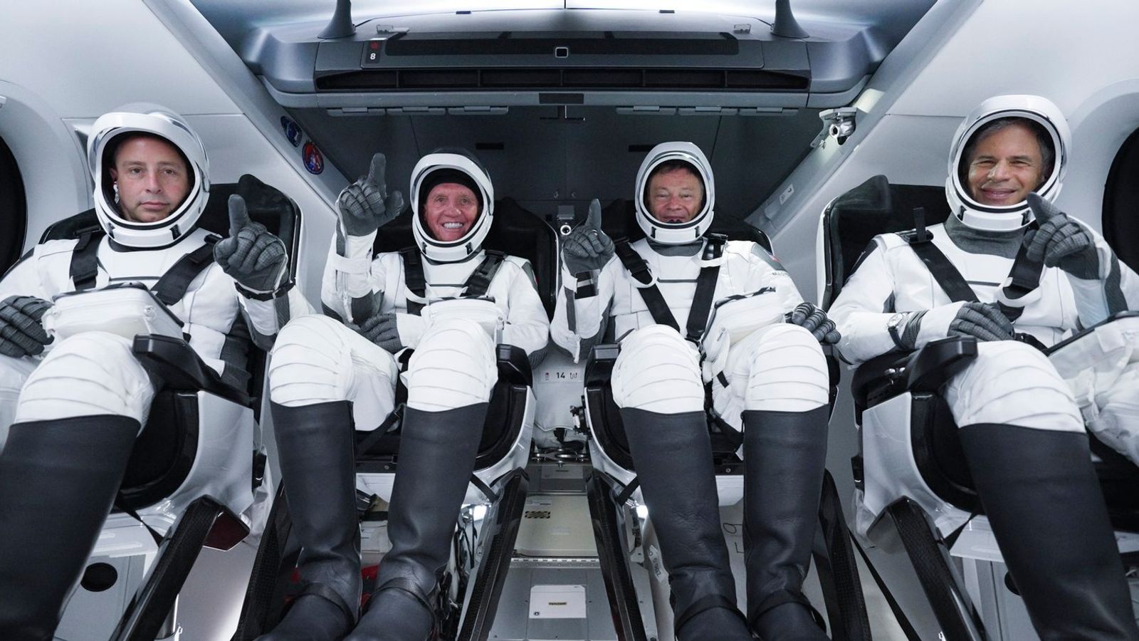 Millionaire space tourists welcomed aboard space station after paying ...