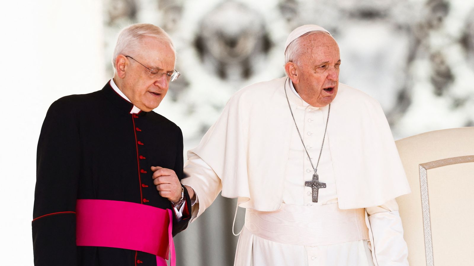 Pope Francis apologises for sitting during audience due to knee pain ...