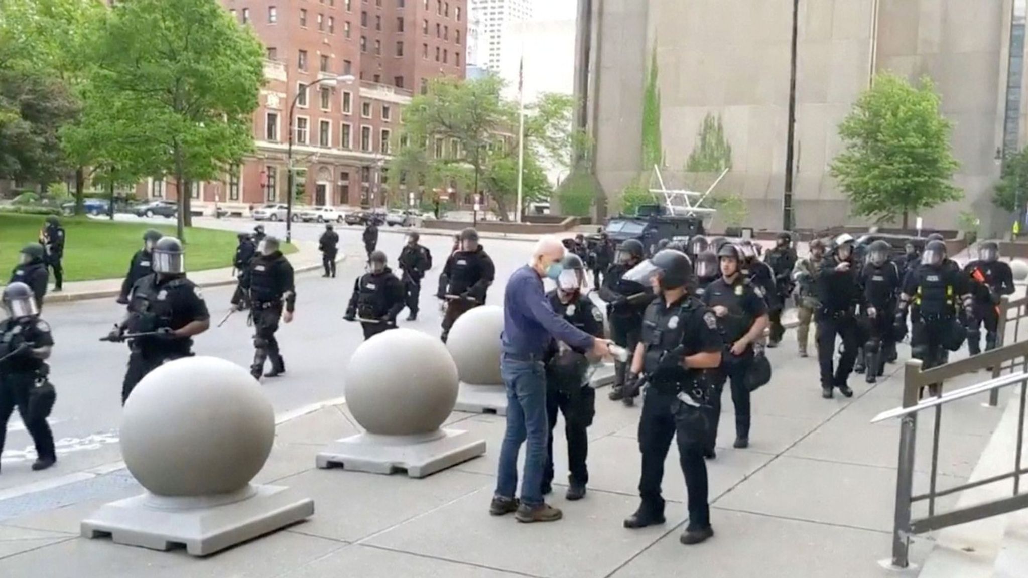 US police officers get their jobs back after pushing elderly man at ...