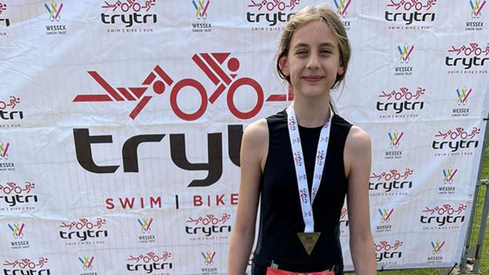Girl, 10, takes on triathlon to raise money in memory of stillborn ...