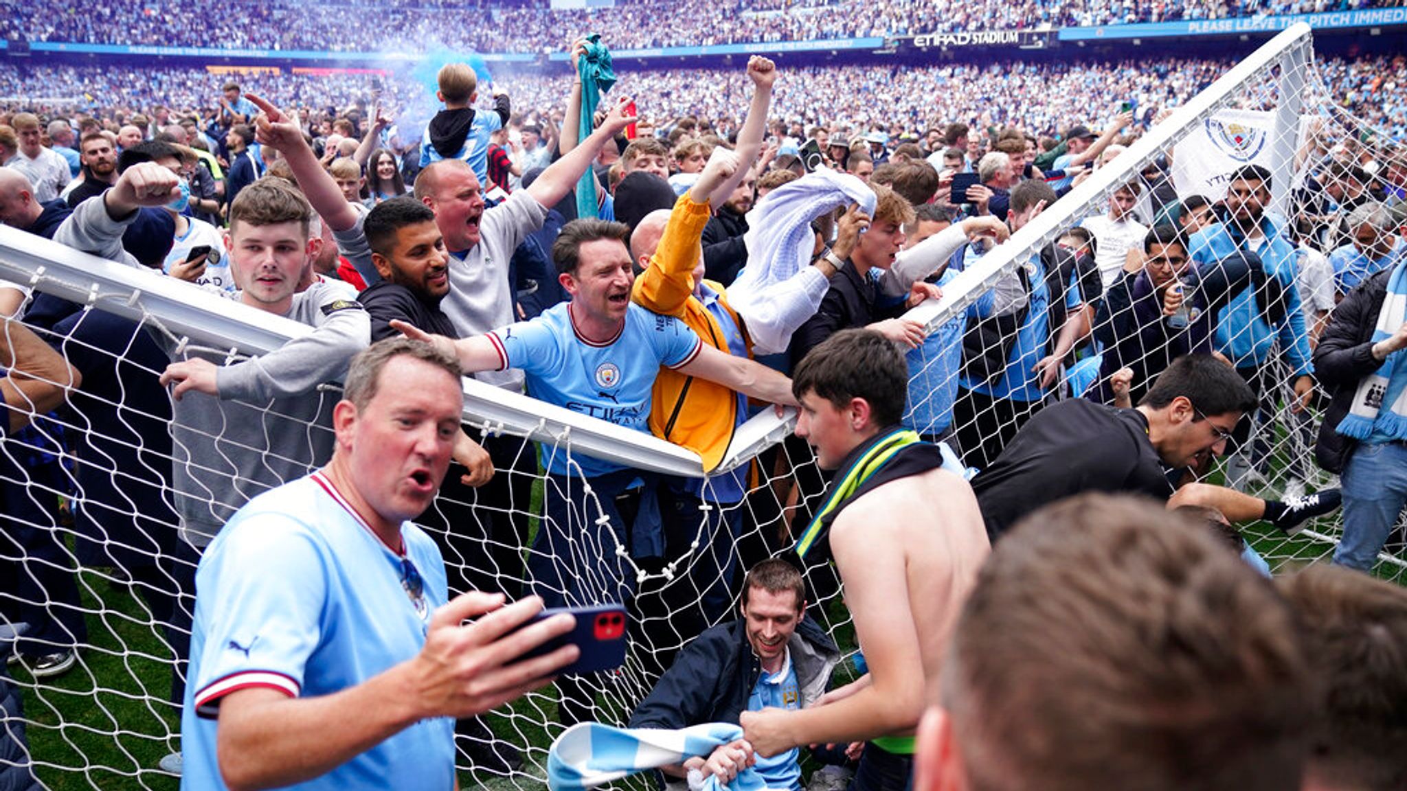 Two charged after unrest following Manchester City's Premier League win ...