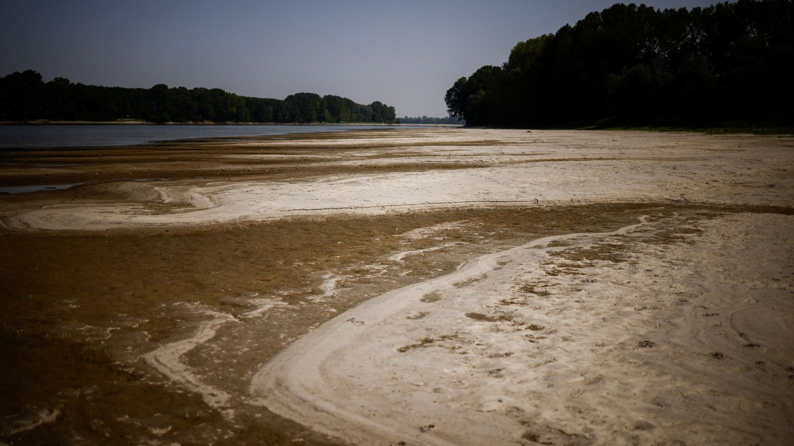 Italy: Seawater crashes through barriers and rushes up rivers as ...