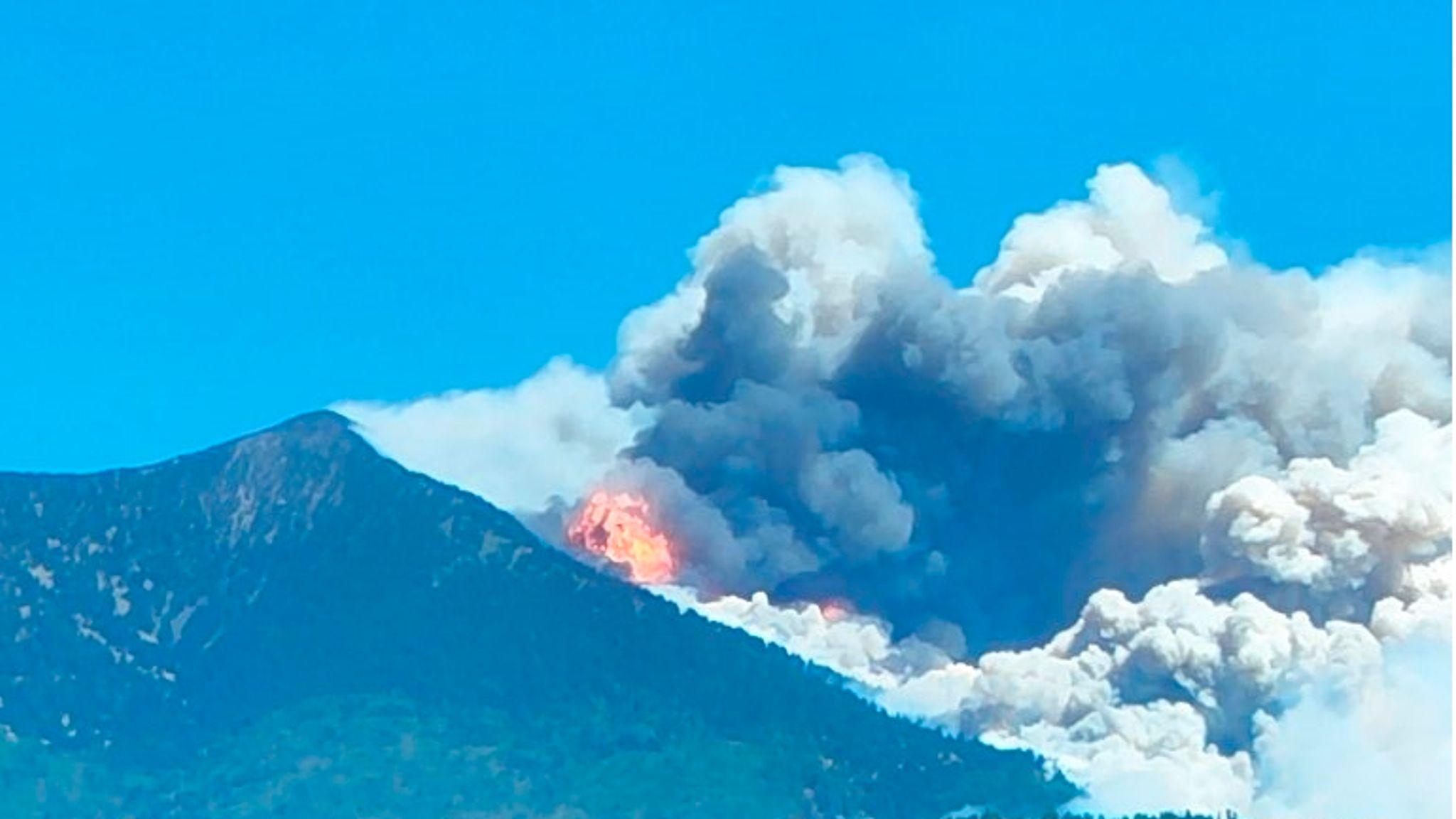 US hit by floods, mudslides, wildfires resembling 'an erupting volcano ...