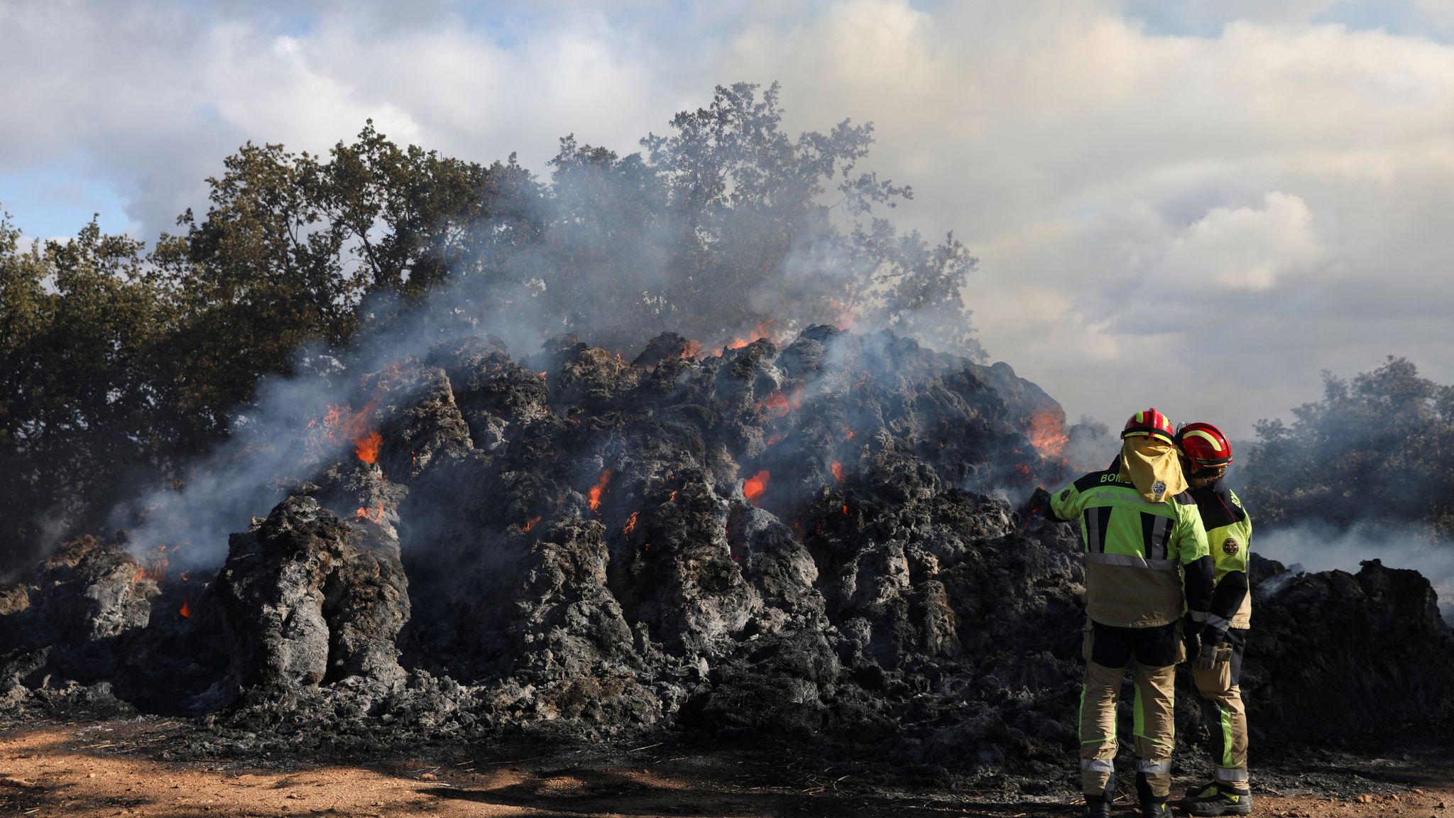 Firefighters battle wildfires across Spain amid heatwave with ...