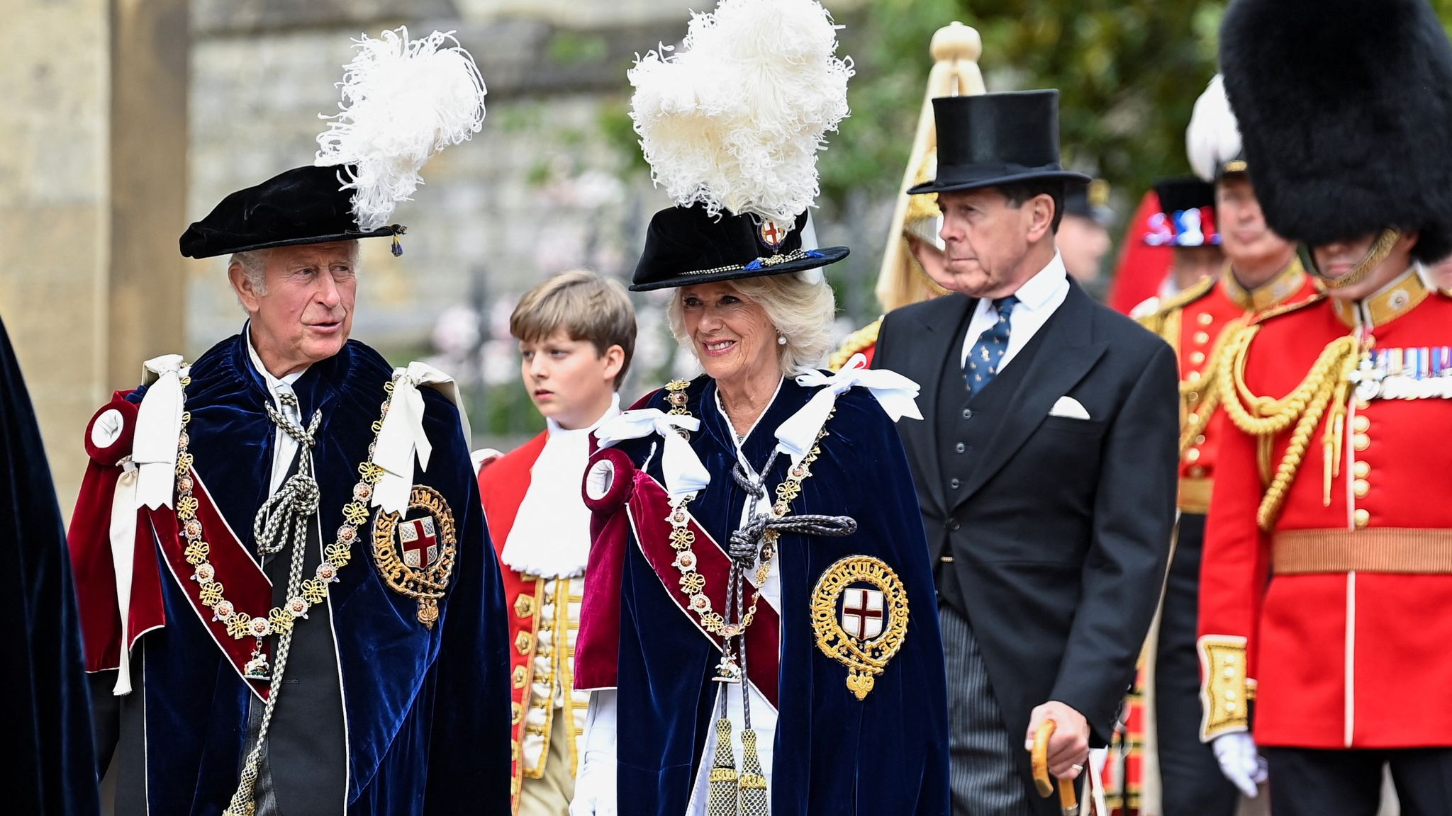 The Queen seen with walking stick as she is pictured with Prince ...