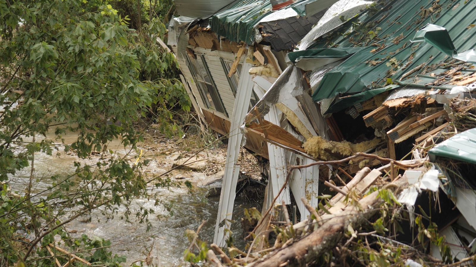 In the small city of Hazard, the debris of destroyed homes shows just ...