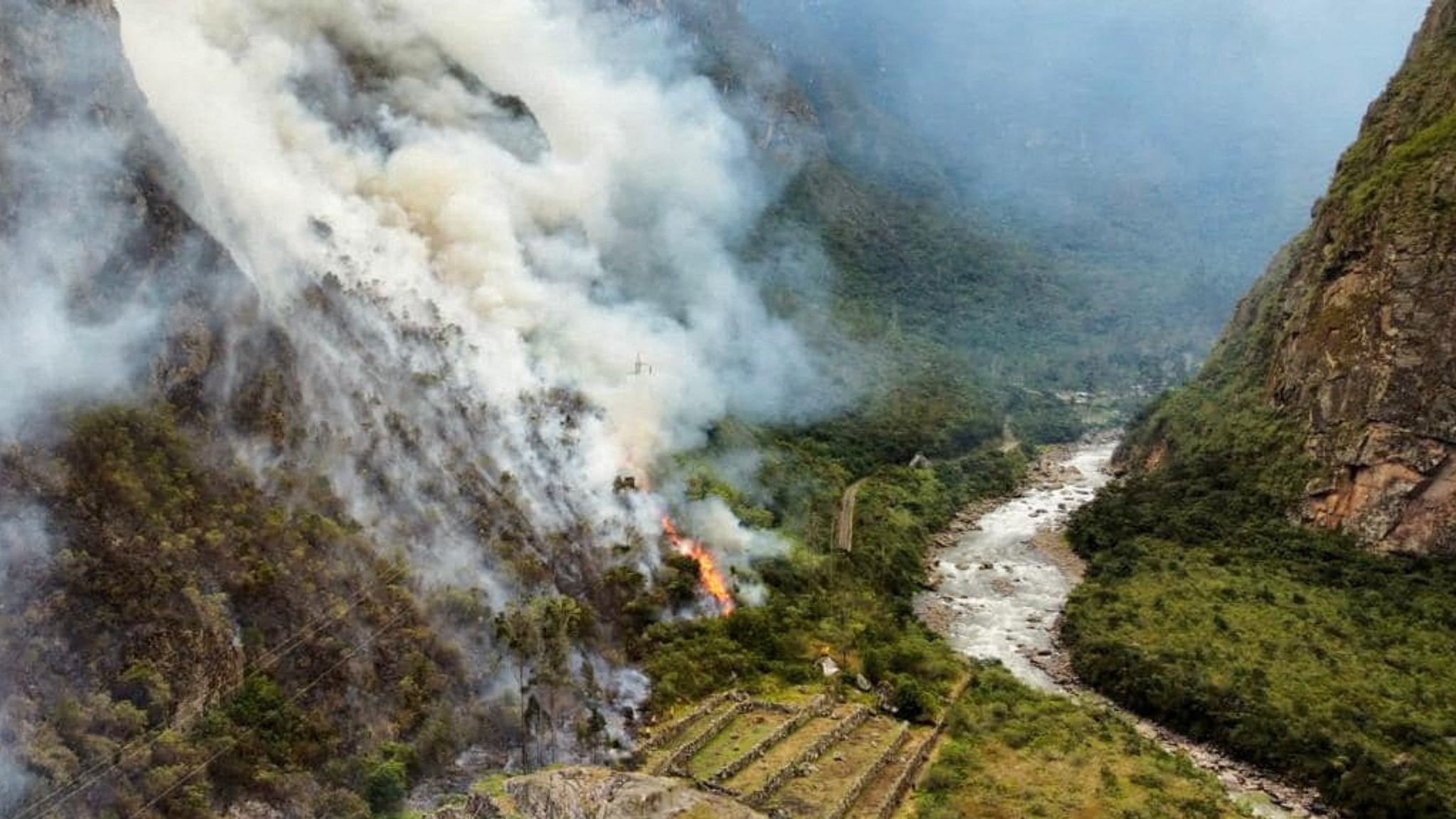 Firefighters battling to contain wildfire near Peru's Machu Picchu in ...