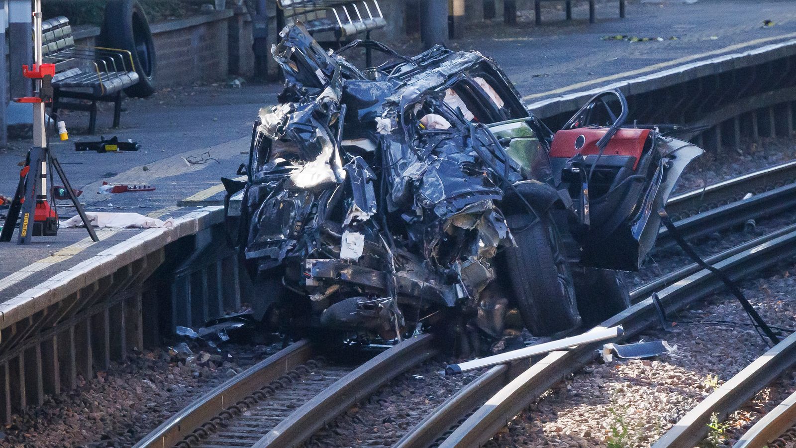 Woman dies in crash which left car on railway track in west London | UK ...