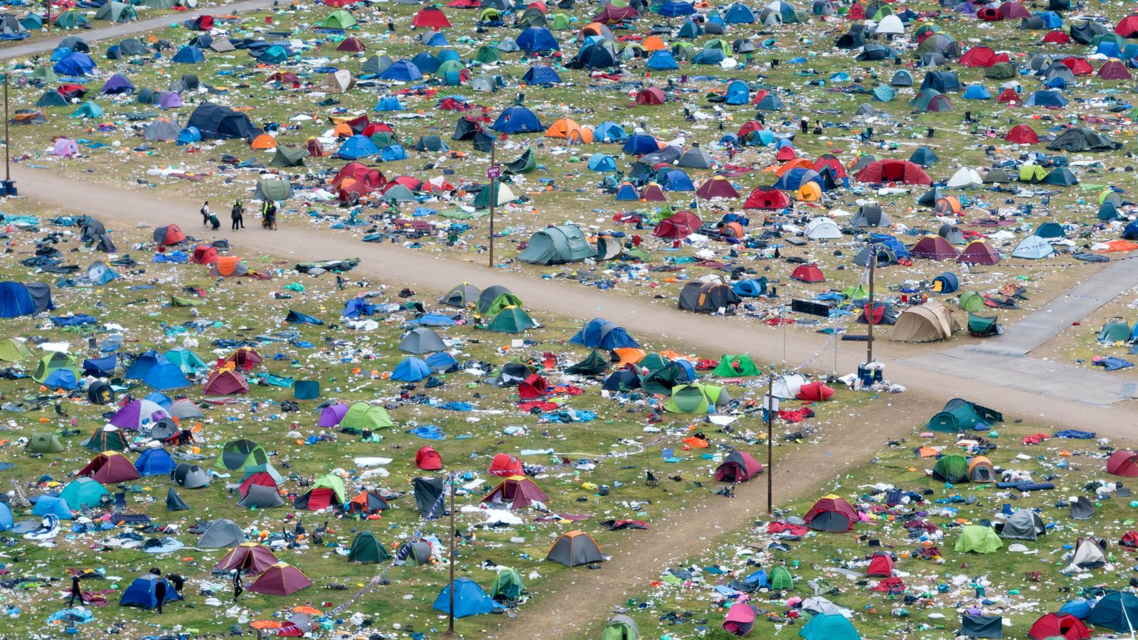 Drone footage shows wasteland of abandoned tents and rubbish left after ...