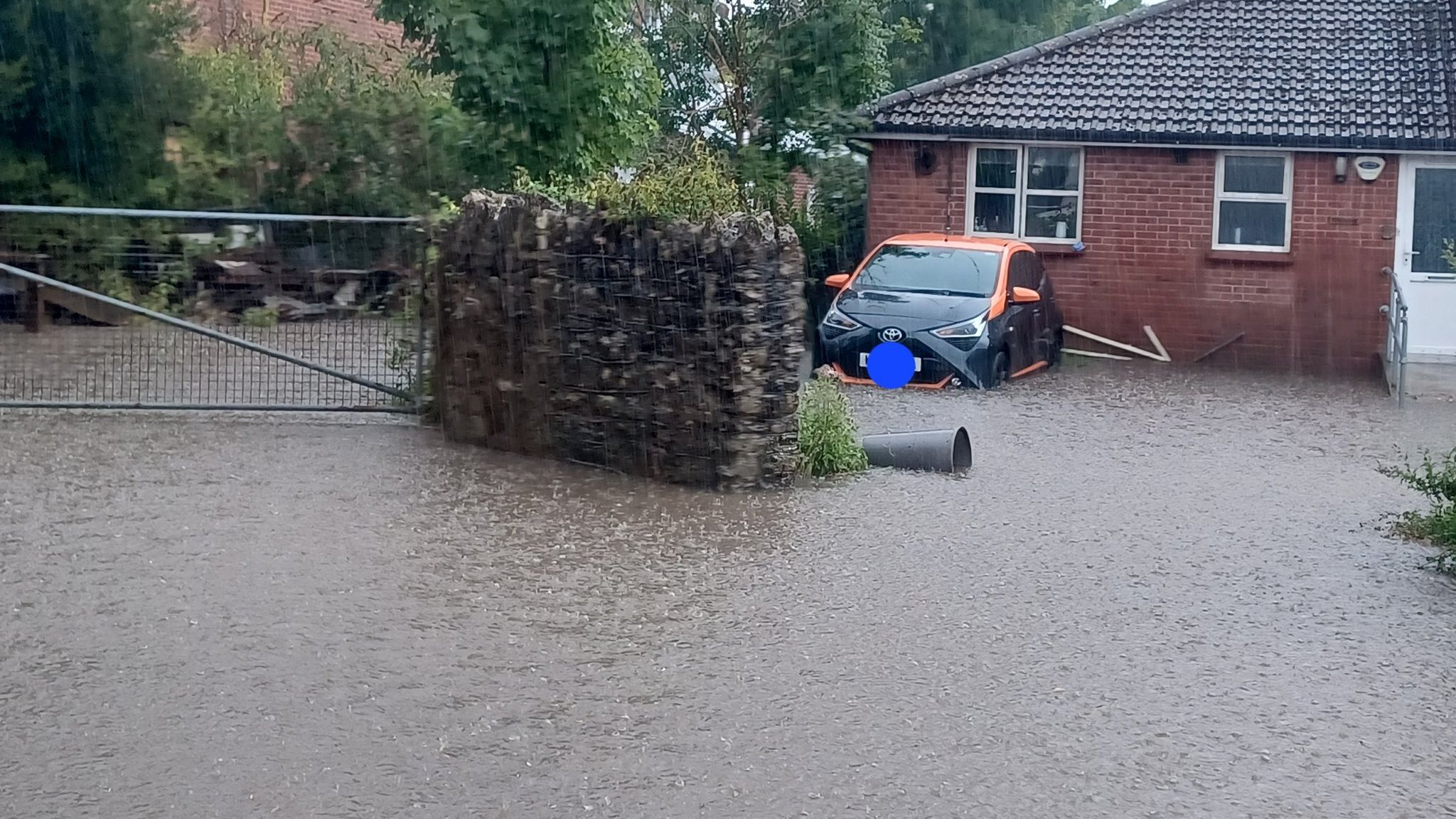 Roads flooded as heavy rain and thunderstorms continue | UK News | Sky News
