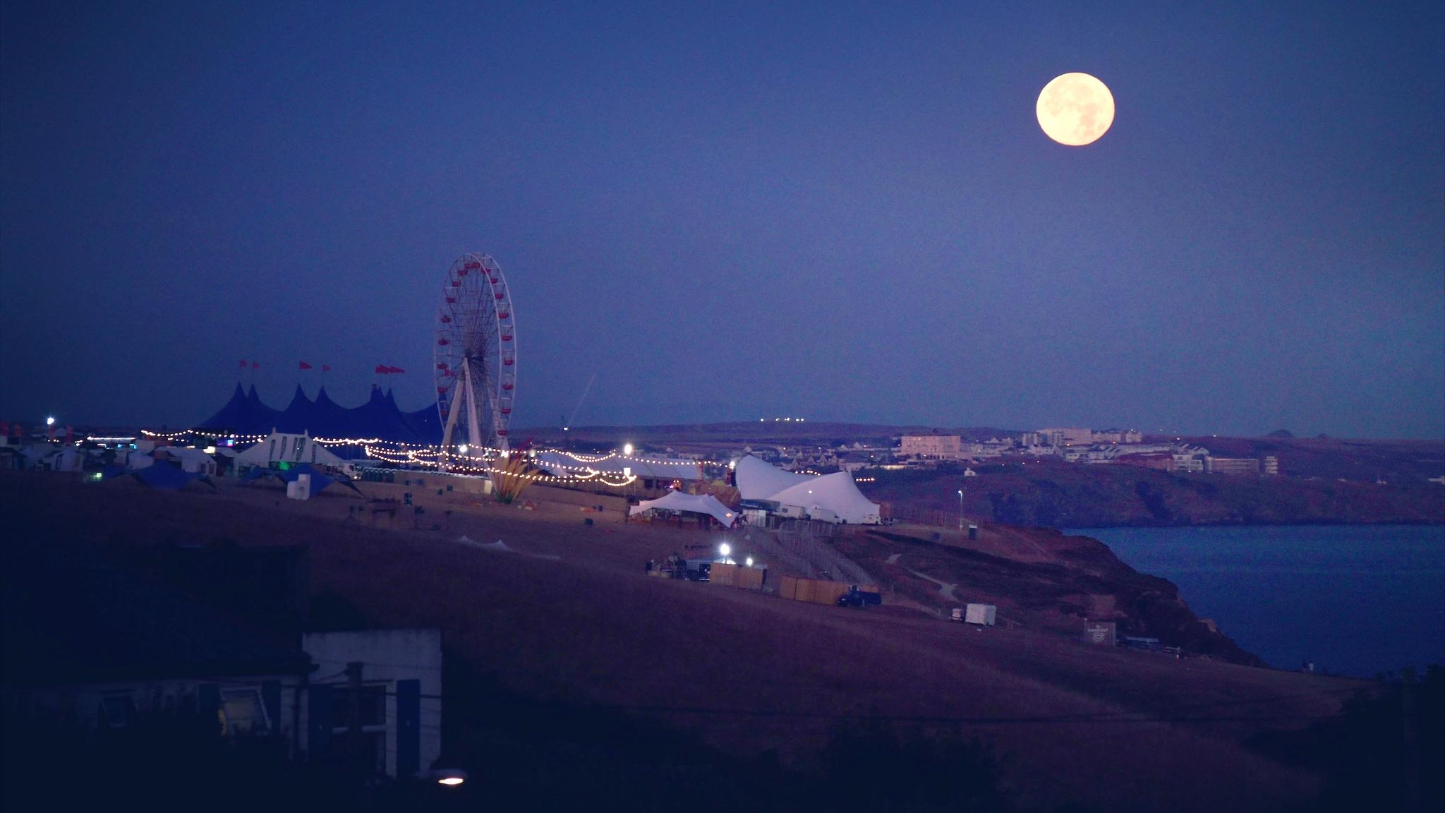 In pictures: Glowing supermoon delights stargazers across the UK and ...