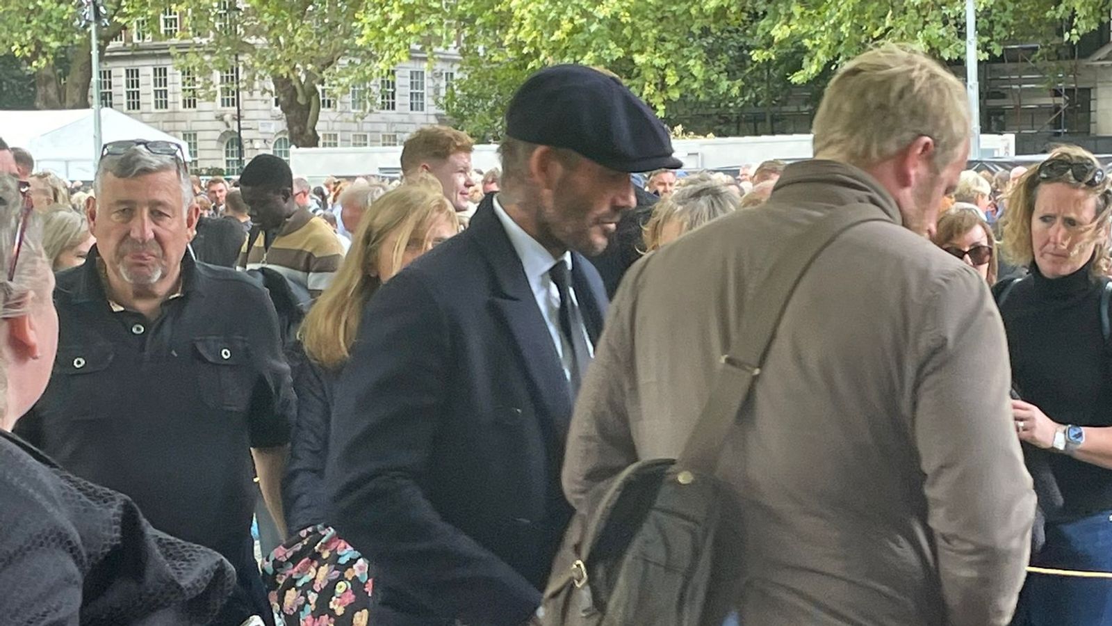 David Beckham in tears as he views Queen's coffin after queueing for 13 ...
