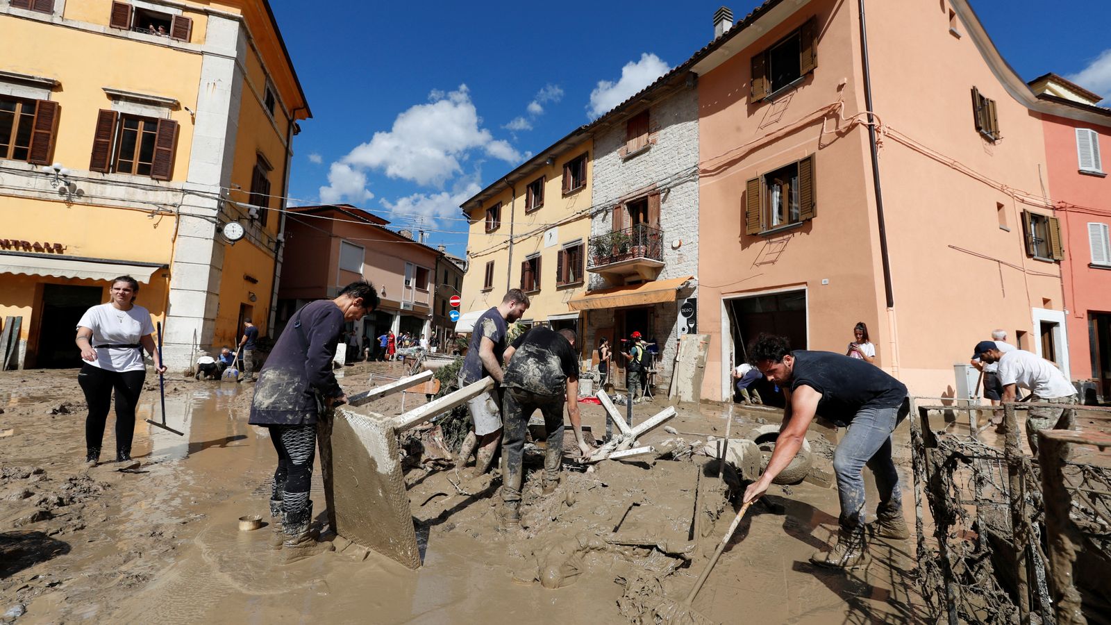 At least 10 dead after 'water bomb' flash floods likened to 'earthquake ...
