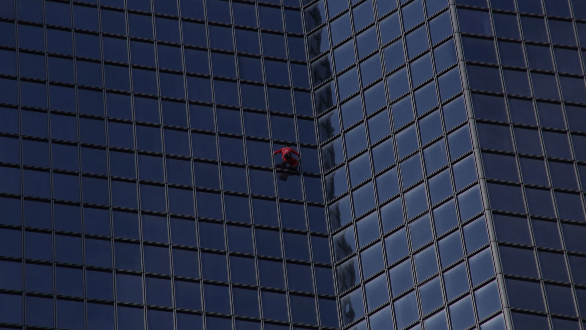 French 'Spiderman' Alain Robert scales 613ft skyscraper to mark 60th ...