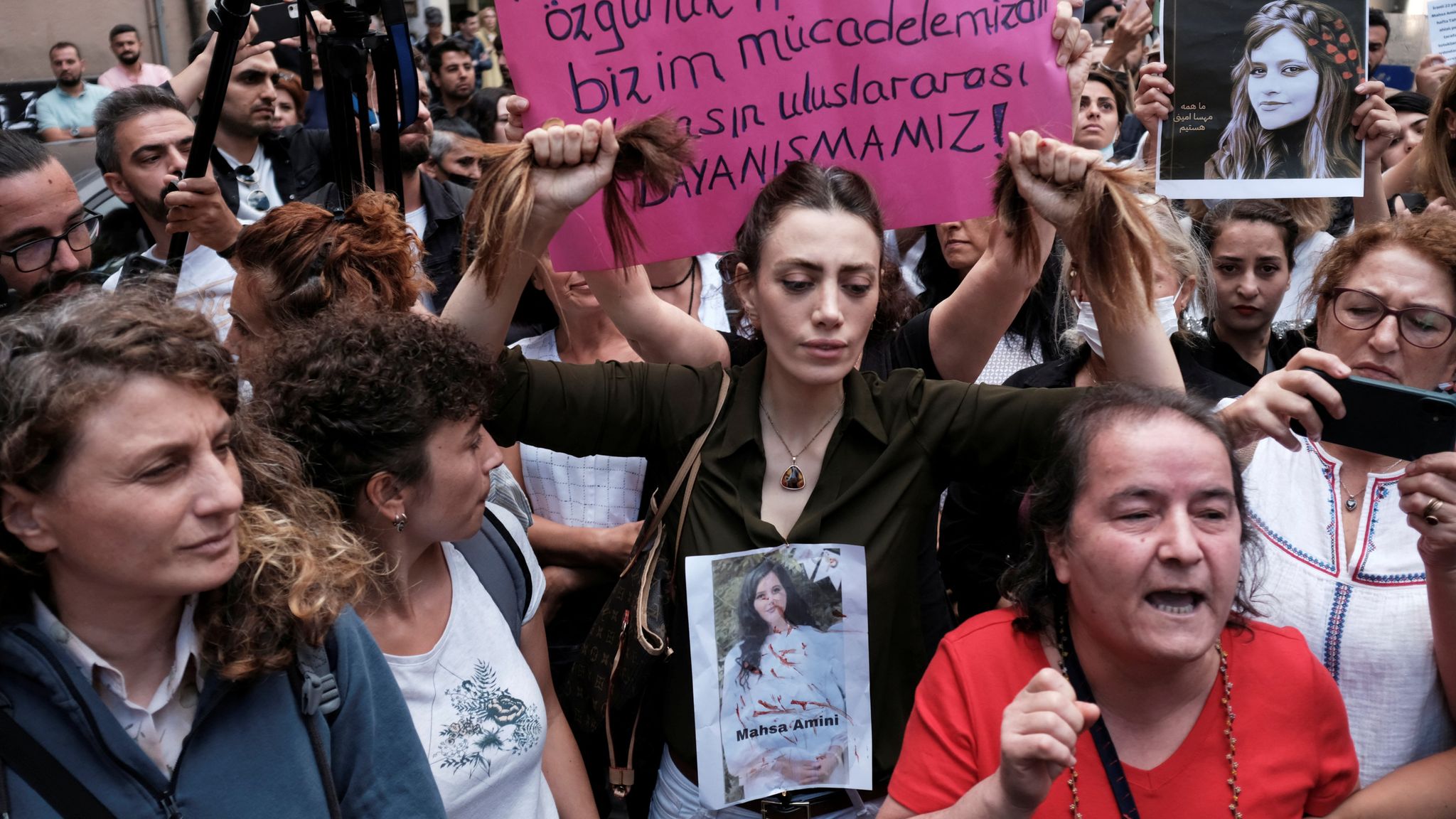 Mahsa Amini: Police assistant dead and four officers injured as ...