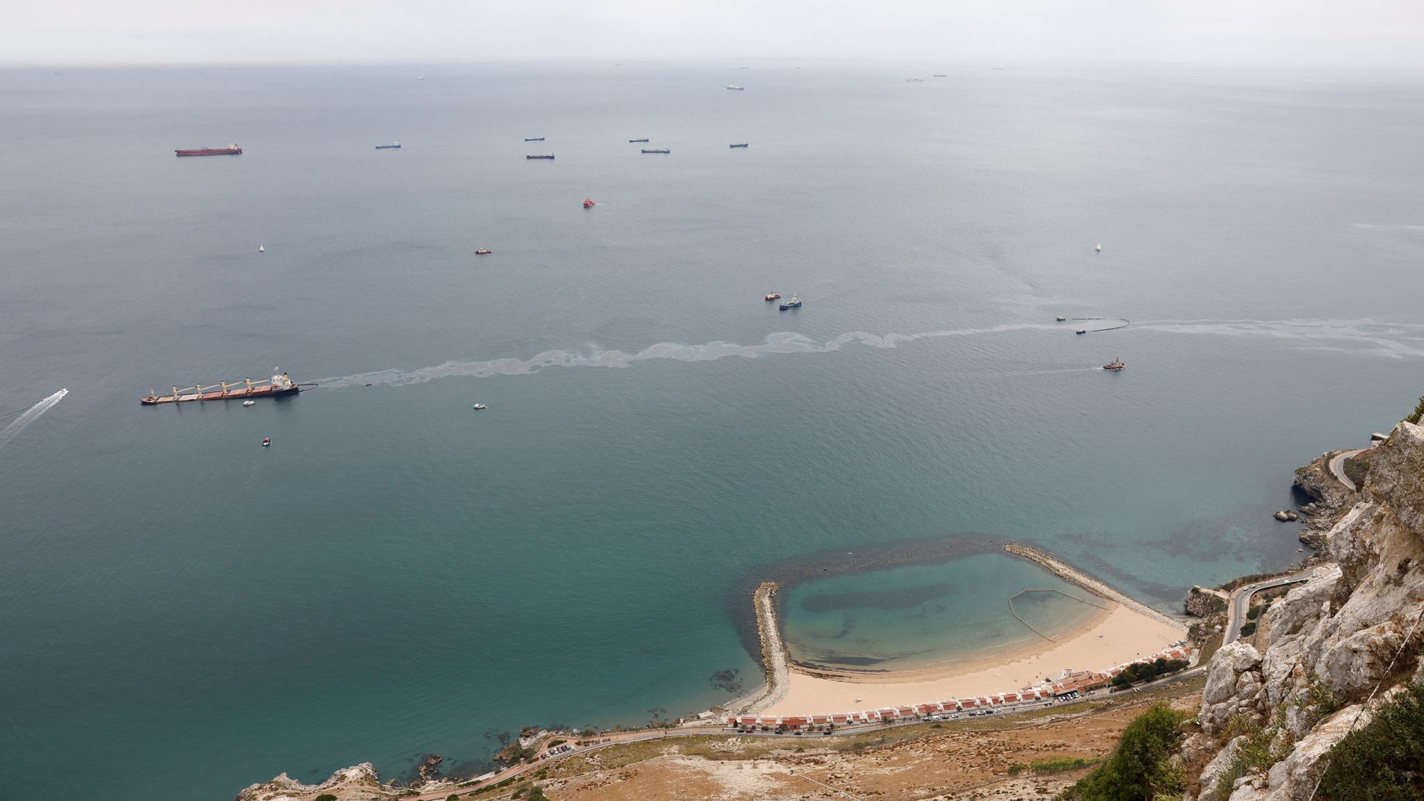 Gibraltar insists fuel leakage from stranded cargo ship is 'under ...
